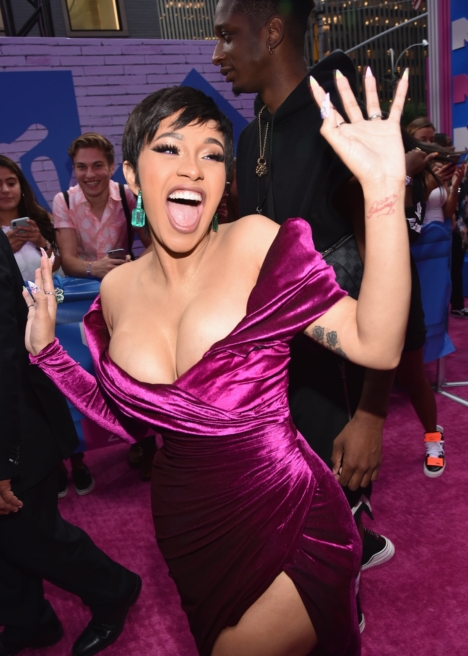 Cardi B S Tattoos And Their Meanings Popsugar Beauty