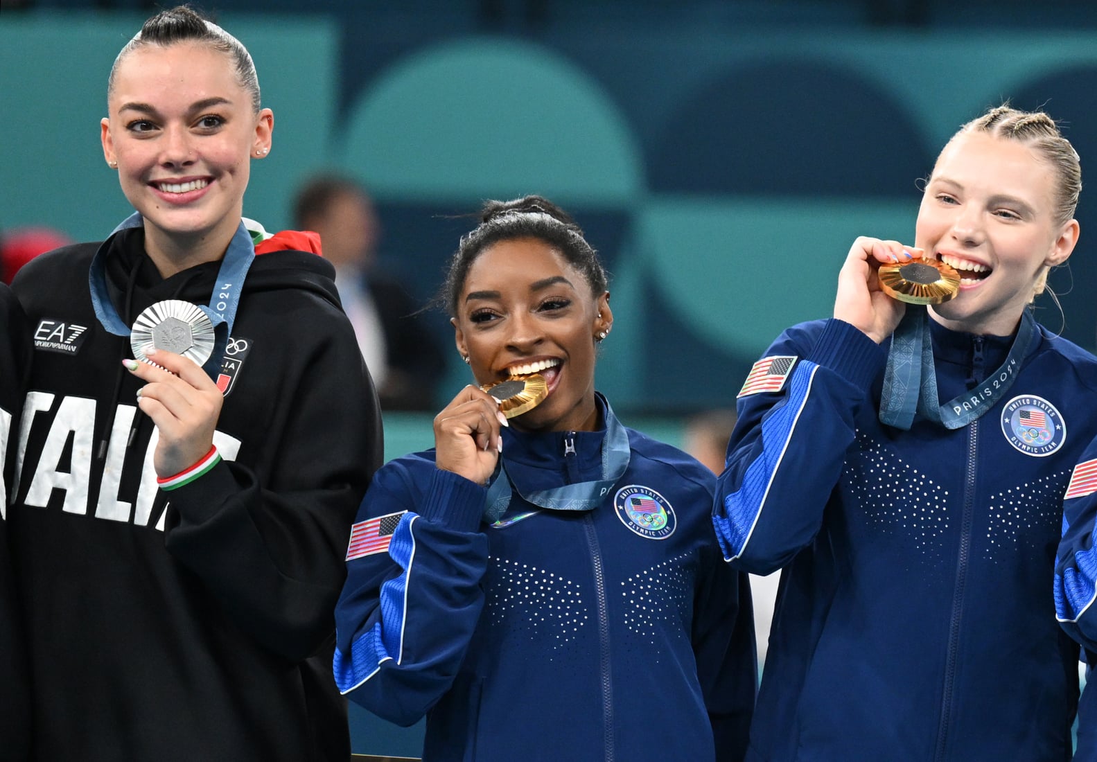 Why Do Olympians Bite Their Medals? | PS Fitness