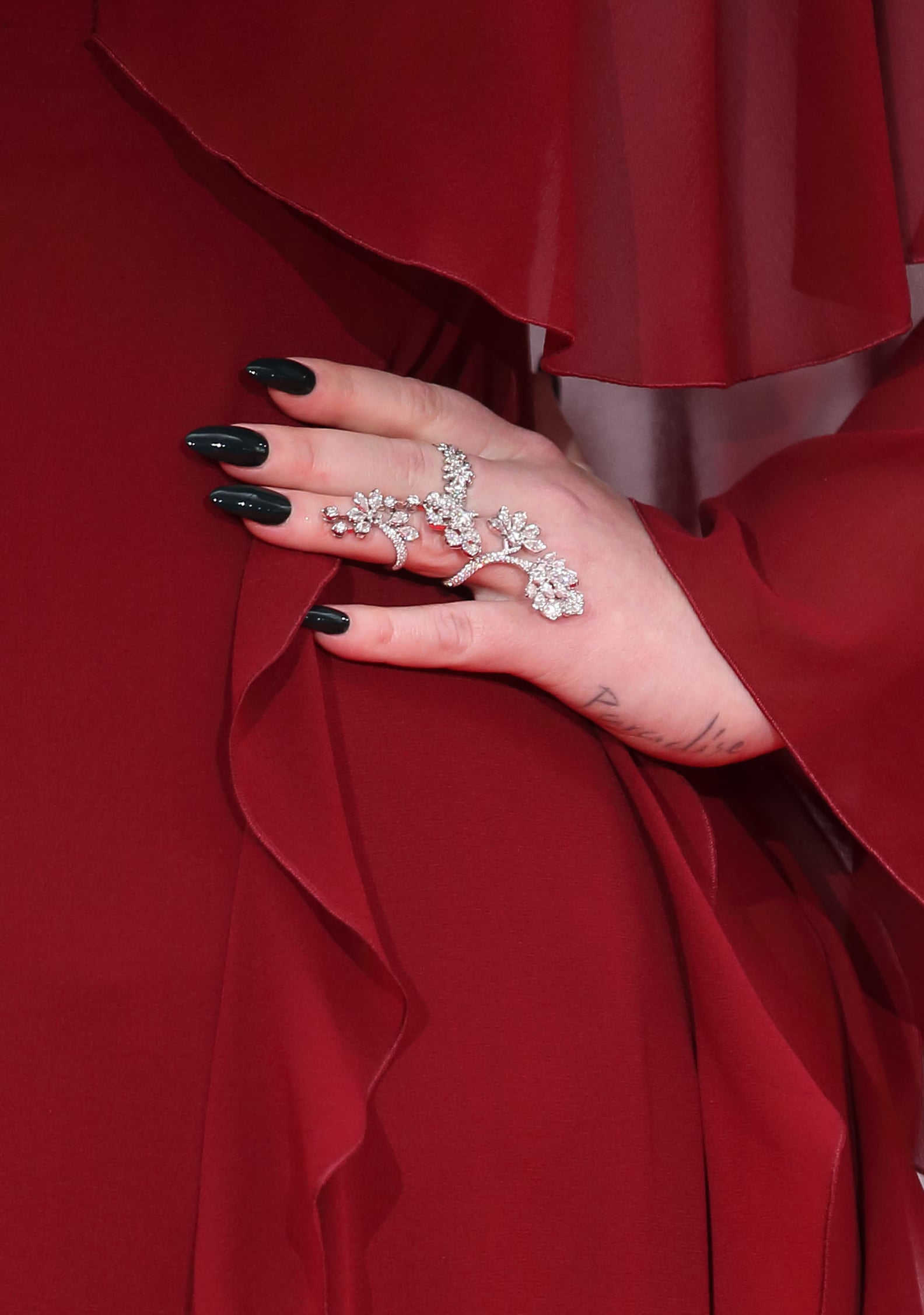 What Do Adele's Tattoos Mean? A Guide to Her Ink | PS Beauty