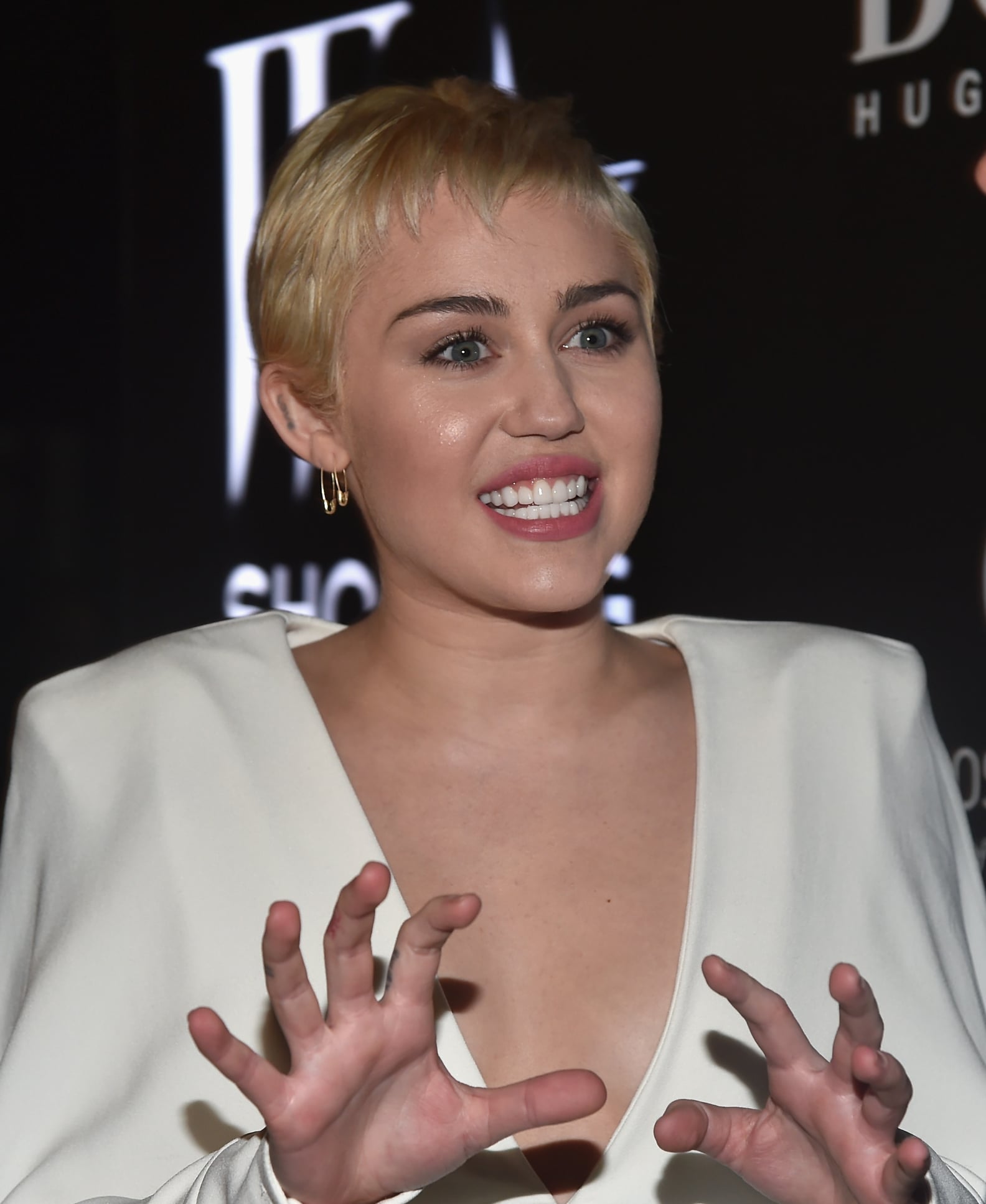 Miley Cyrus at W's Shooting Stars Exhibit 2015 | Pictures | PS Celebrity