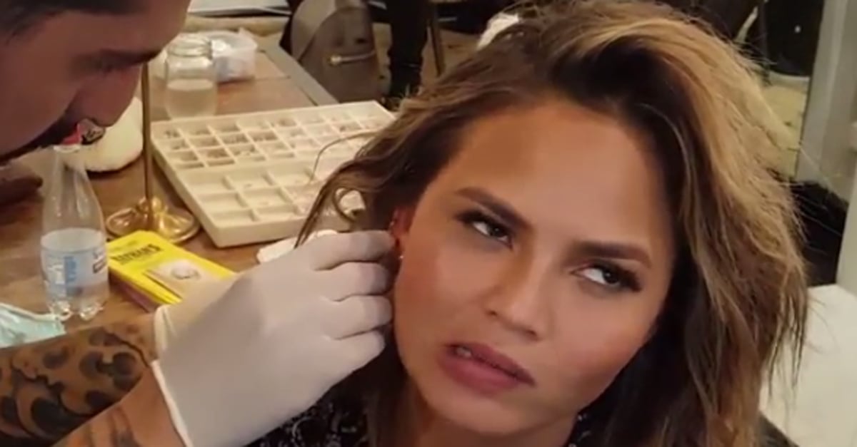 John Legend Sings as Chrissy Teigen Gets Her Ears Pierced | PS Celebrity