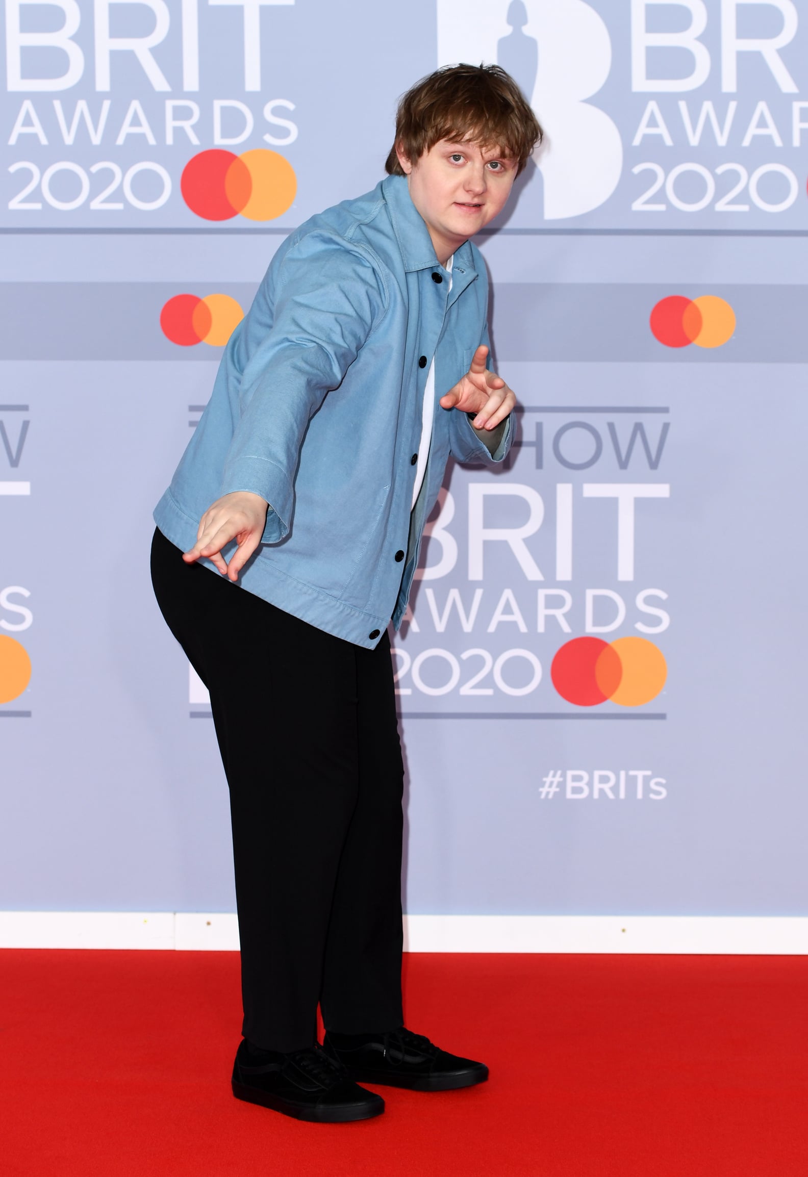 Lewis Capaldi Posing on the 2020 BRIT Awards Red Carpet | PS Celebrity