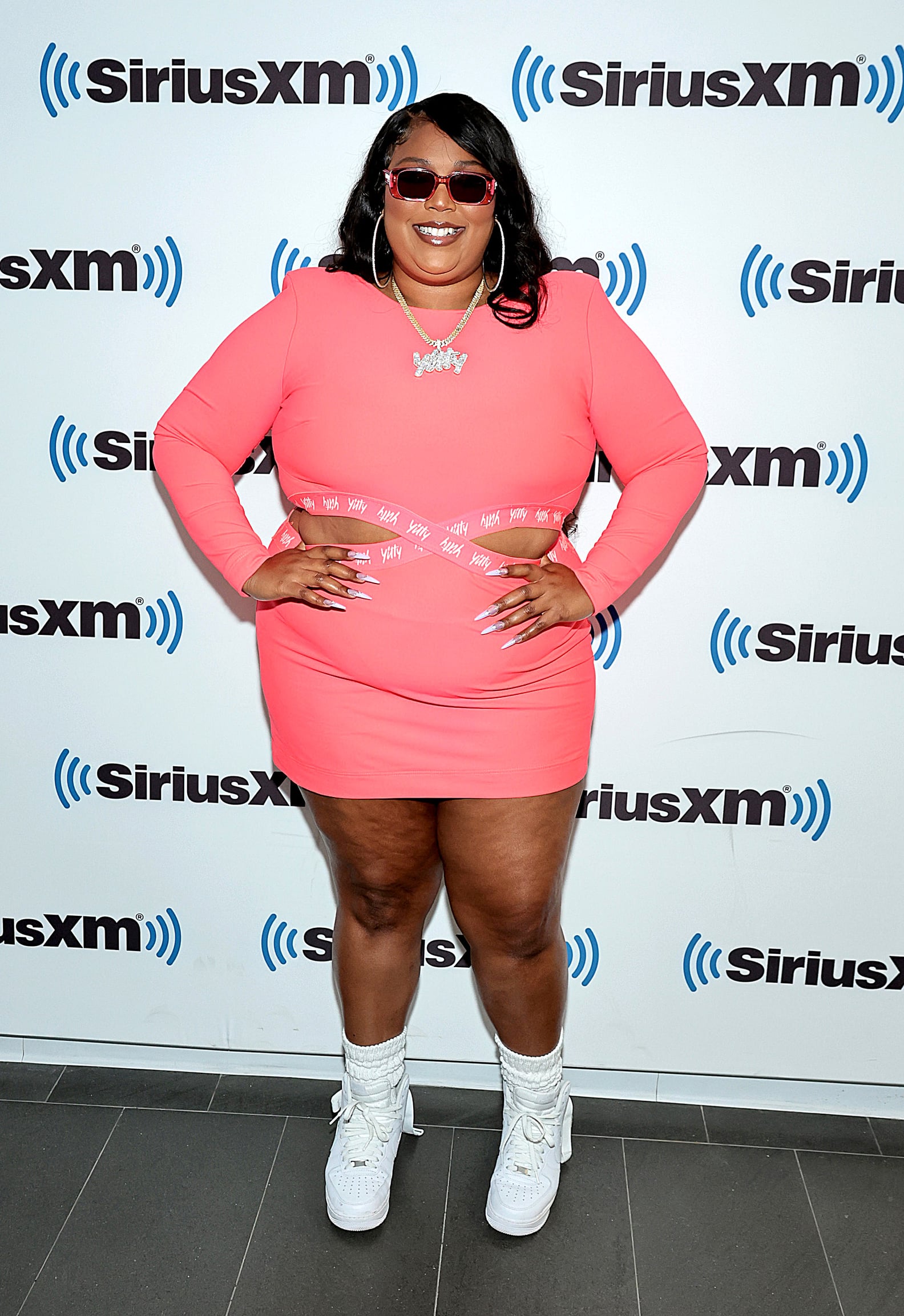 Lizzo Visits SiriusXM in a Pink Cutout Yitty Minidress | PS Fashion