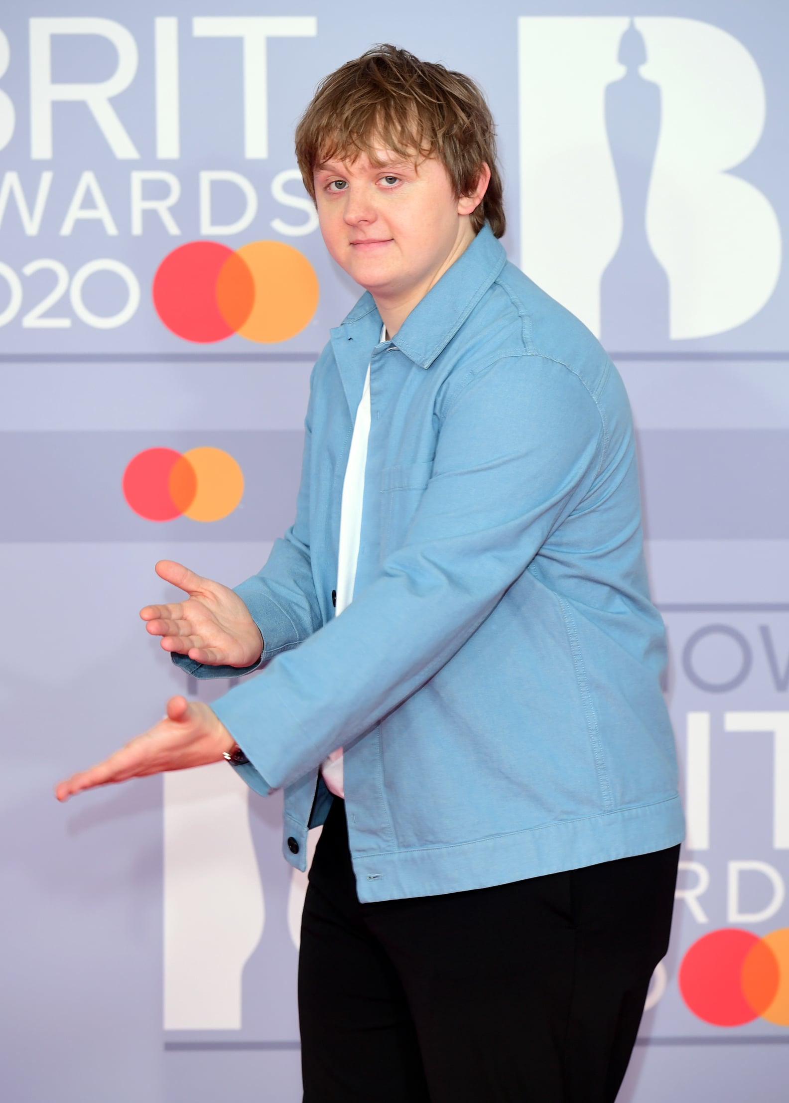 Lewis Capaldi Posing on the 2020 BRIT Awards Red Carpet | PS Celebrity
