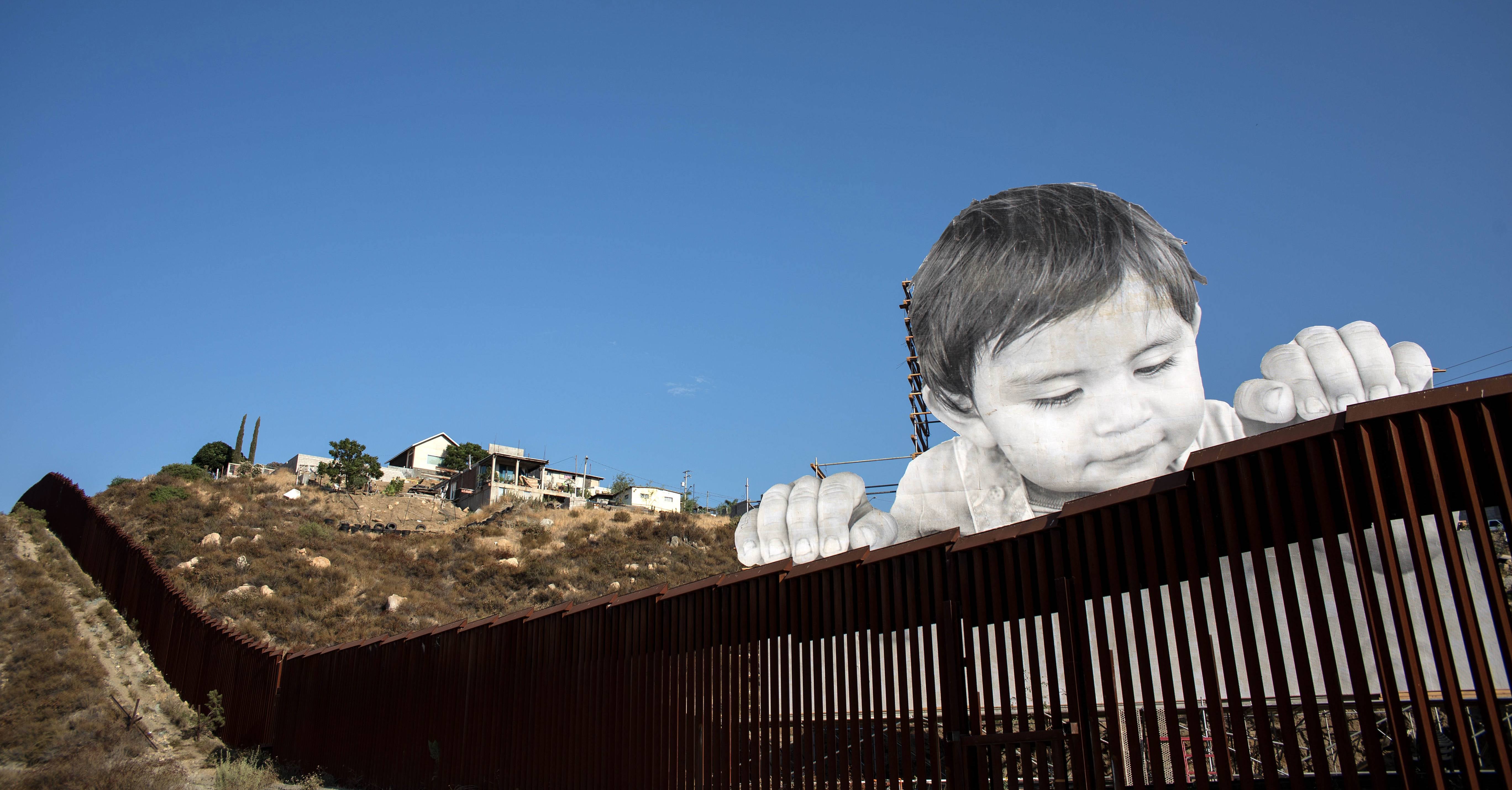 Mexico Border Wall Art Installation of a Child by JR | PS News