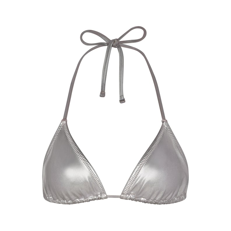 See Kim Kardashian Model the Skims Metallic Swim Collection | PS Fashion