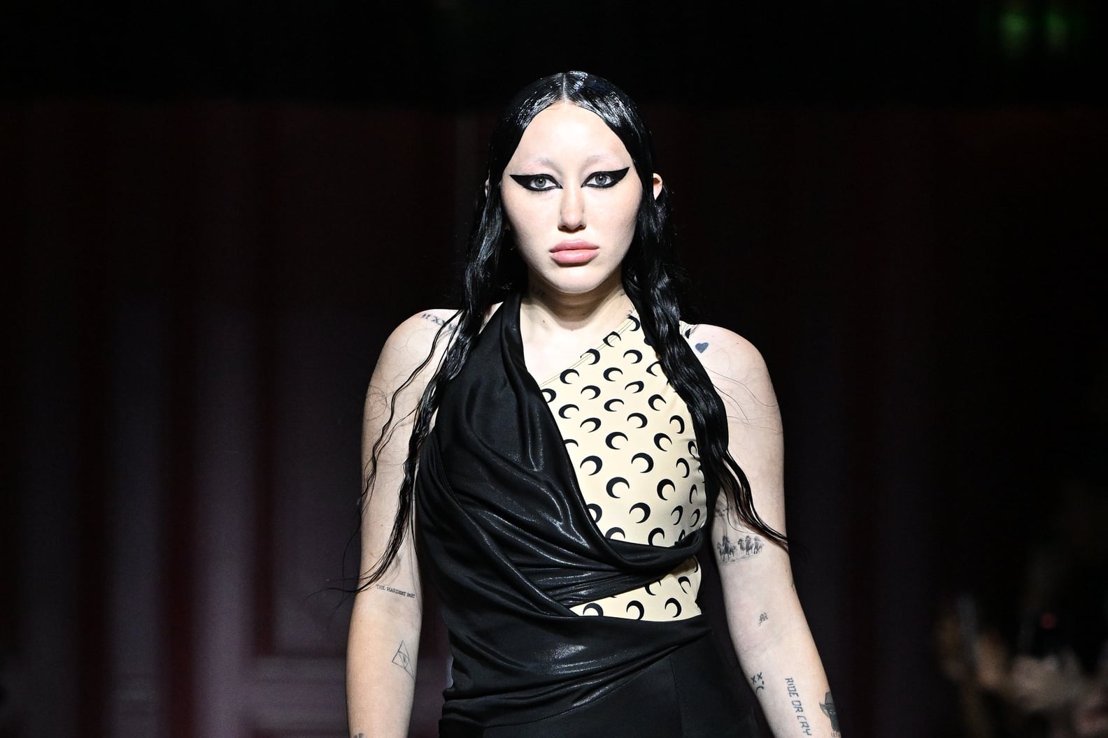 Noah Cyrus Performs in Sheer Knit Dress and Face Covering | PS Fashion