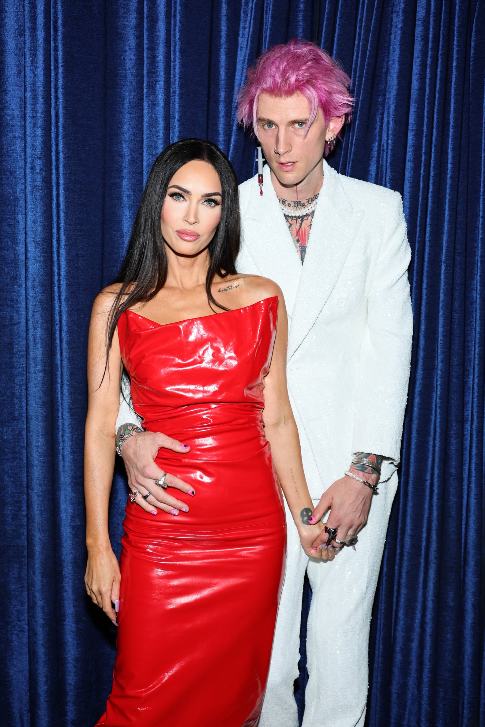 Megan Fox's Red Latex Dress and MGK's Blood Syringe Earring | PS Fashion