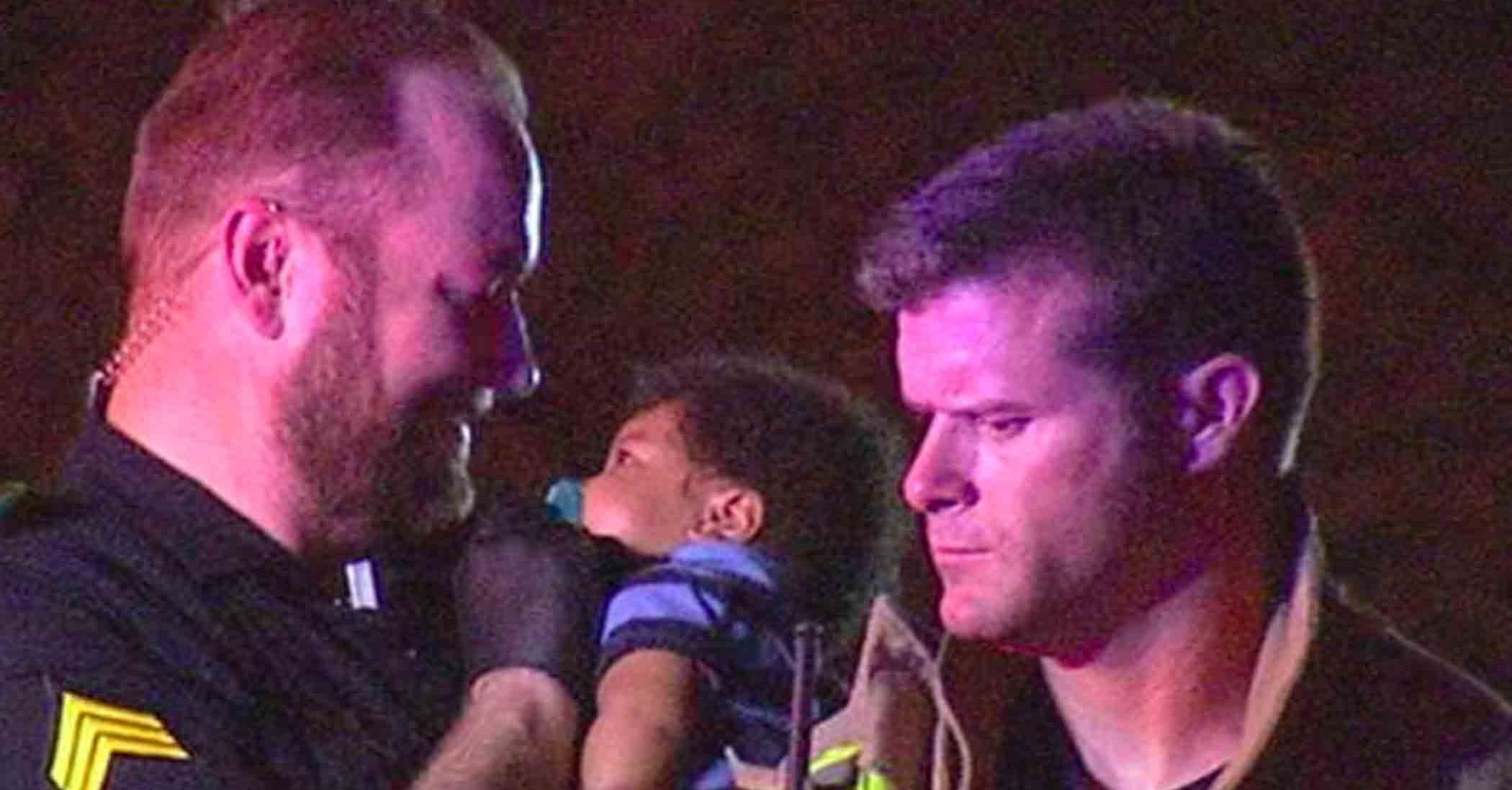 Viral Photo of a Police Officer Comforting a Baby | PS Family