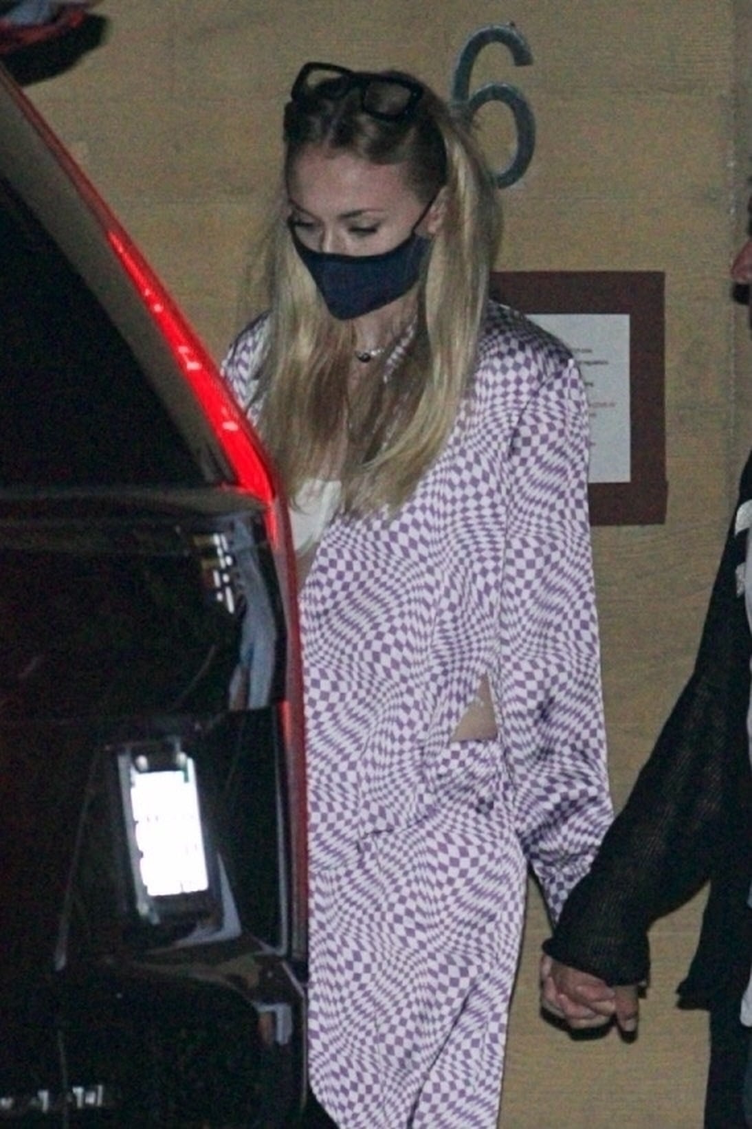 Sophie Turner's Purple Checkered Pajamas on Date Night | PS Fashion
