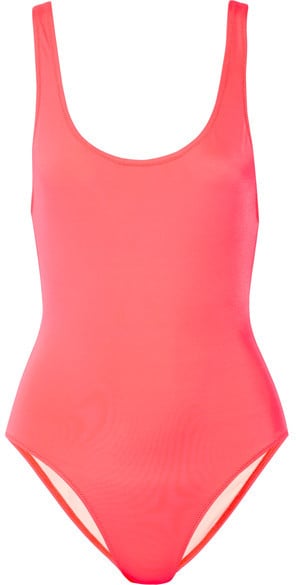Look Pretty In Pink In This Solid And Striped Anne Marie Swimsuit The