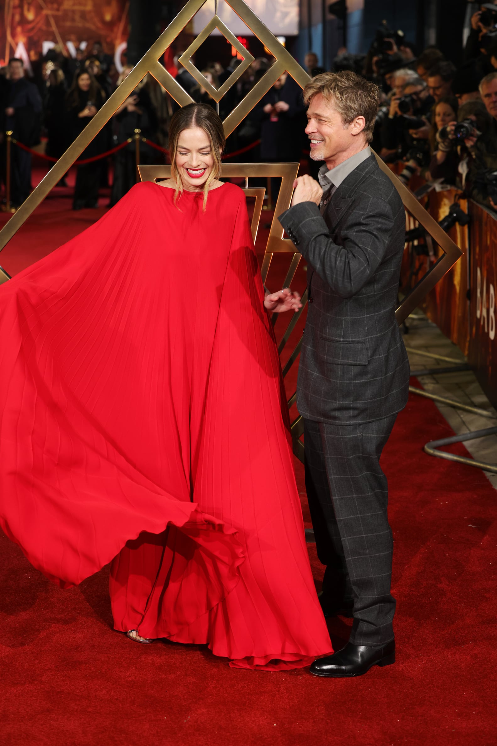 Margot Robbie Stuns in Red Valentino Gown in London | PS UK Fashion