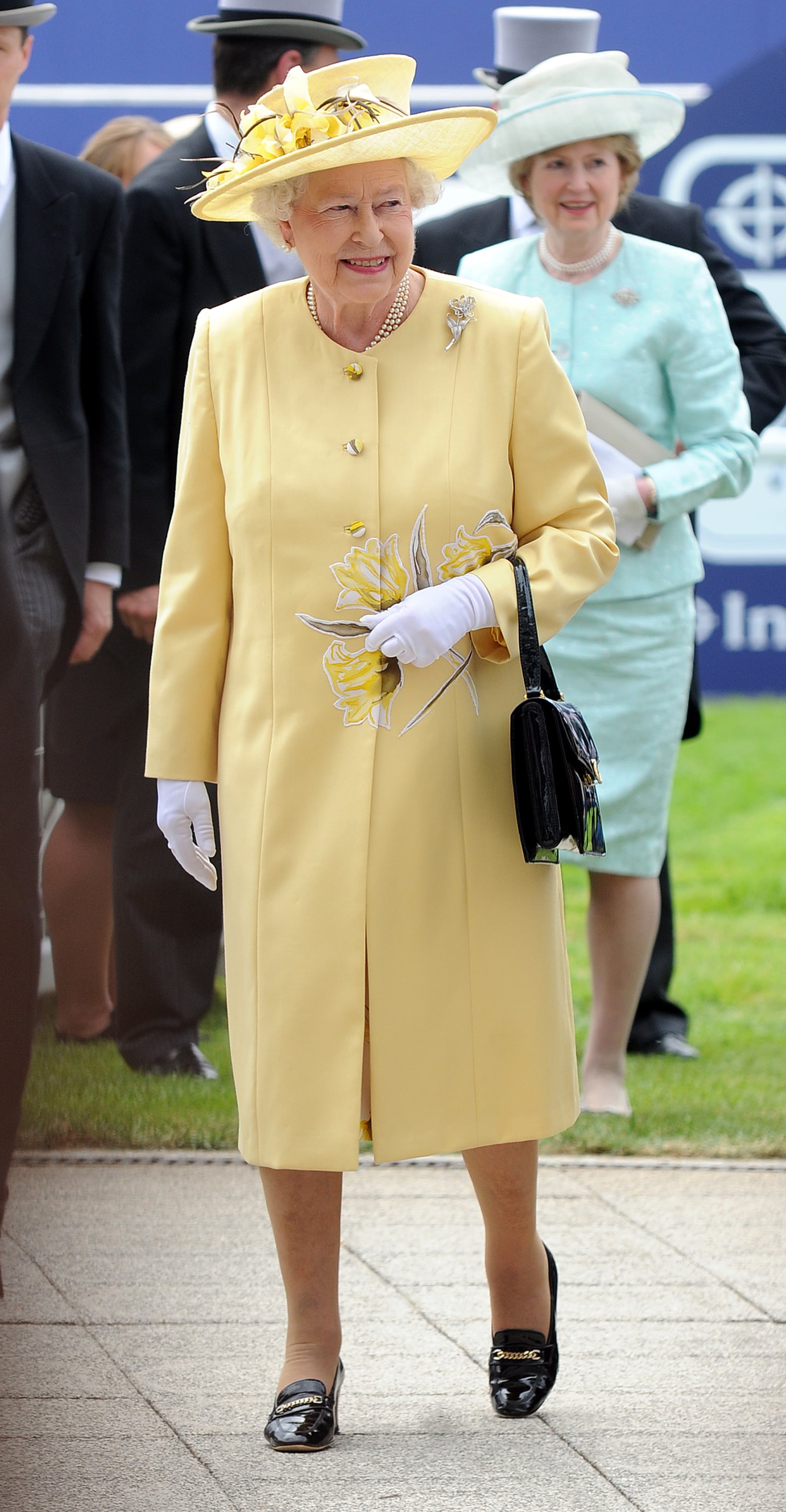 Why the Queen Wears So Many Bright Colors | PS Fashion