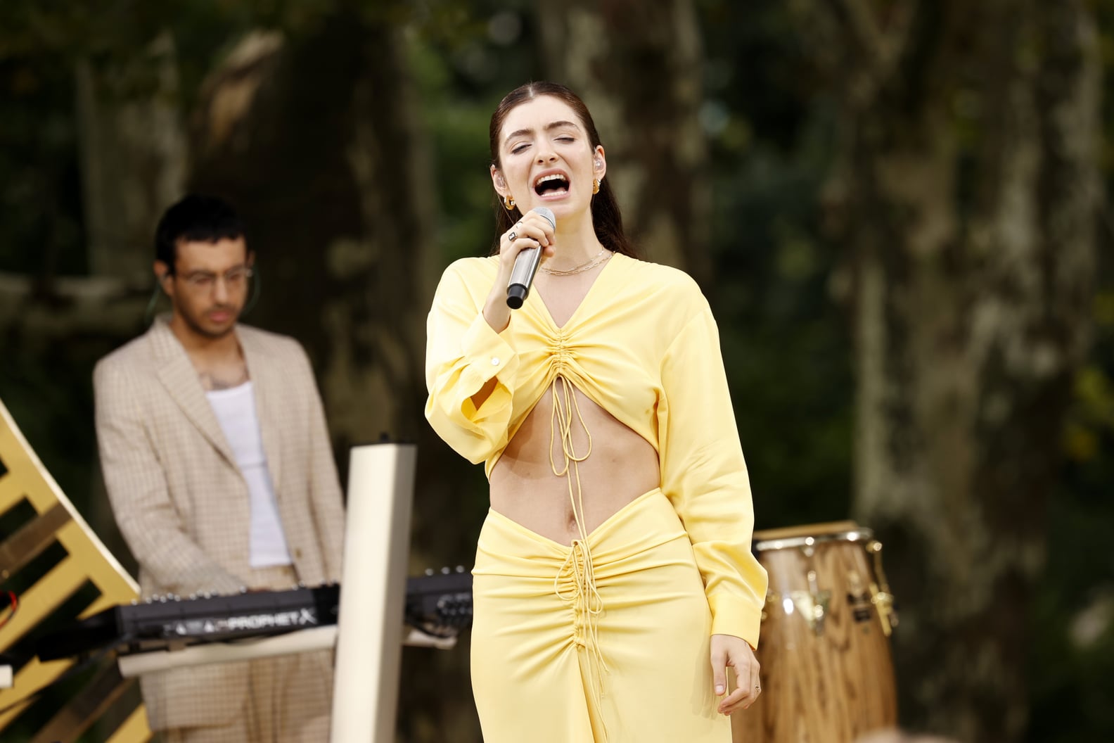 Lorde Promotes Solar Power in Yellow Christopher Esber Dress | PS Fashion