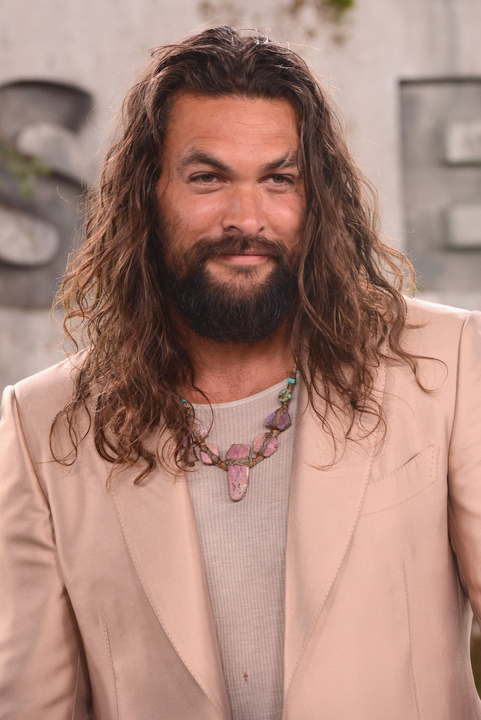 Jason Momoa Is a Red Carpet Stud in His Pink Tom Ford Suit | PS Fashion