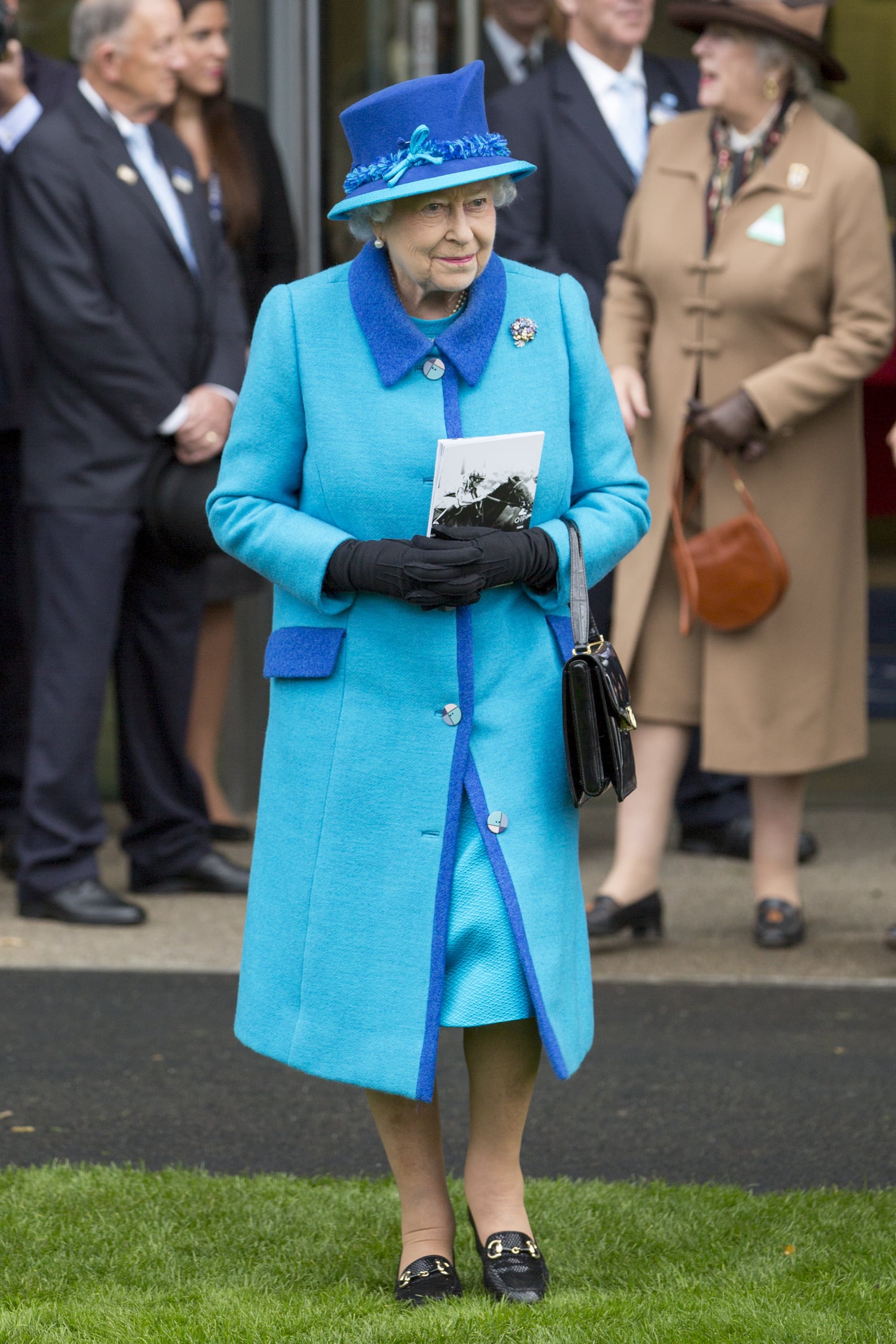 Why the Queen Wears So Many Bright Colors | PS Fashion