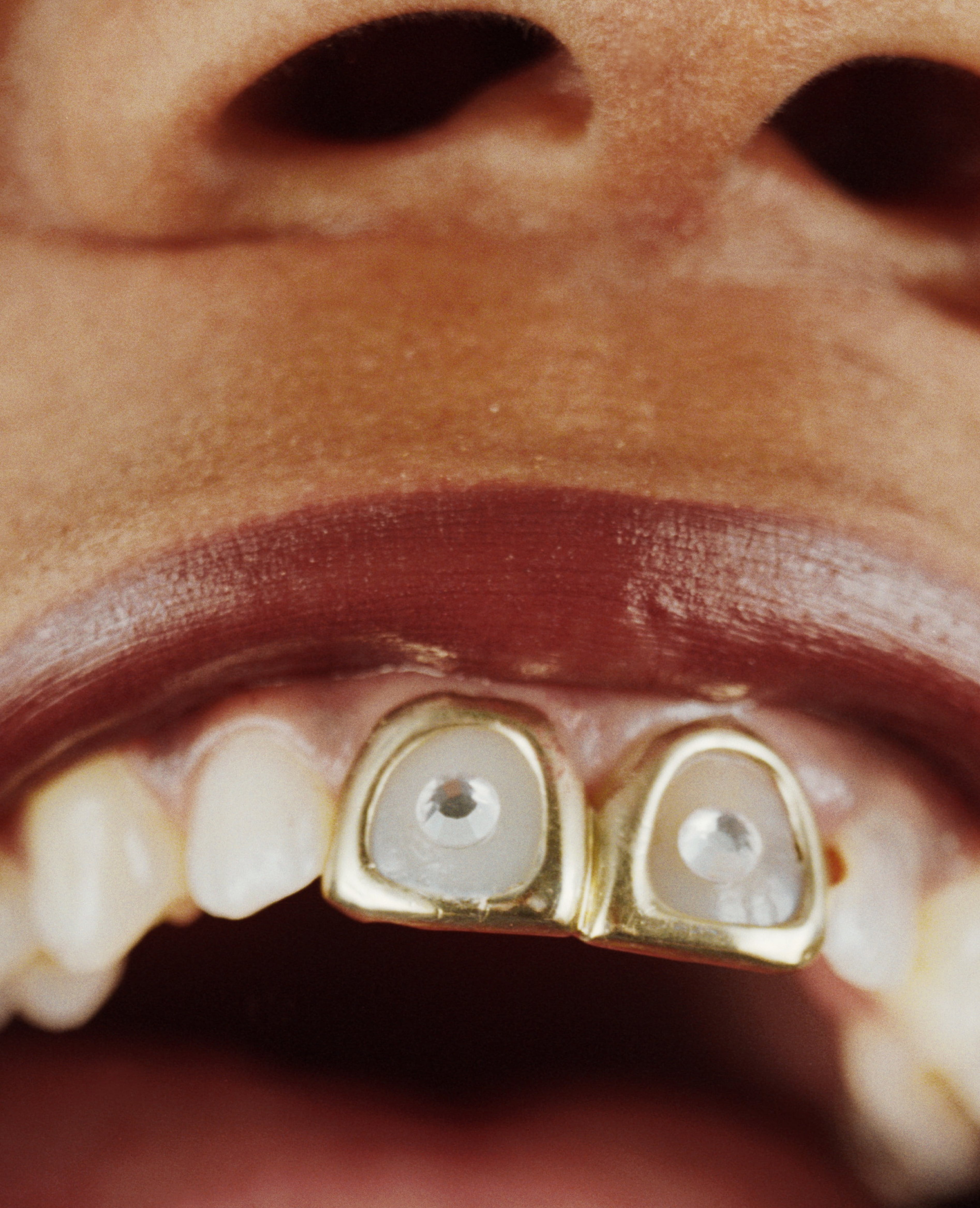 The History of Tooth Gems, the Latest Beauty "Trend" | POPSUGAR Beauty