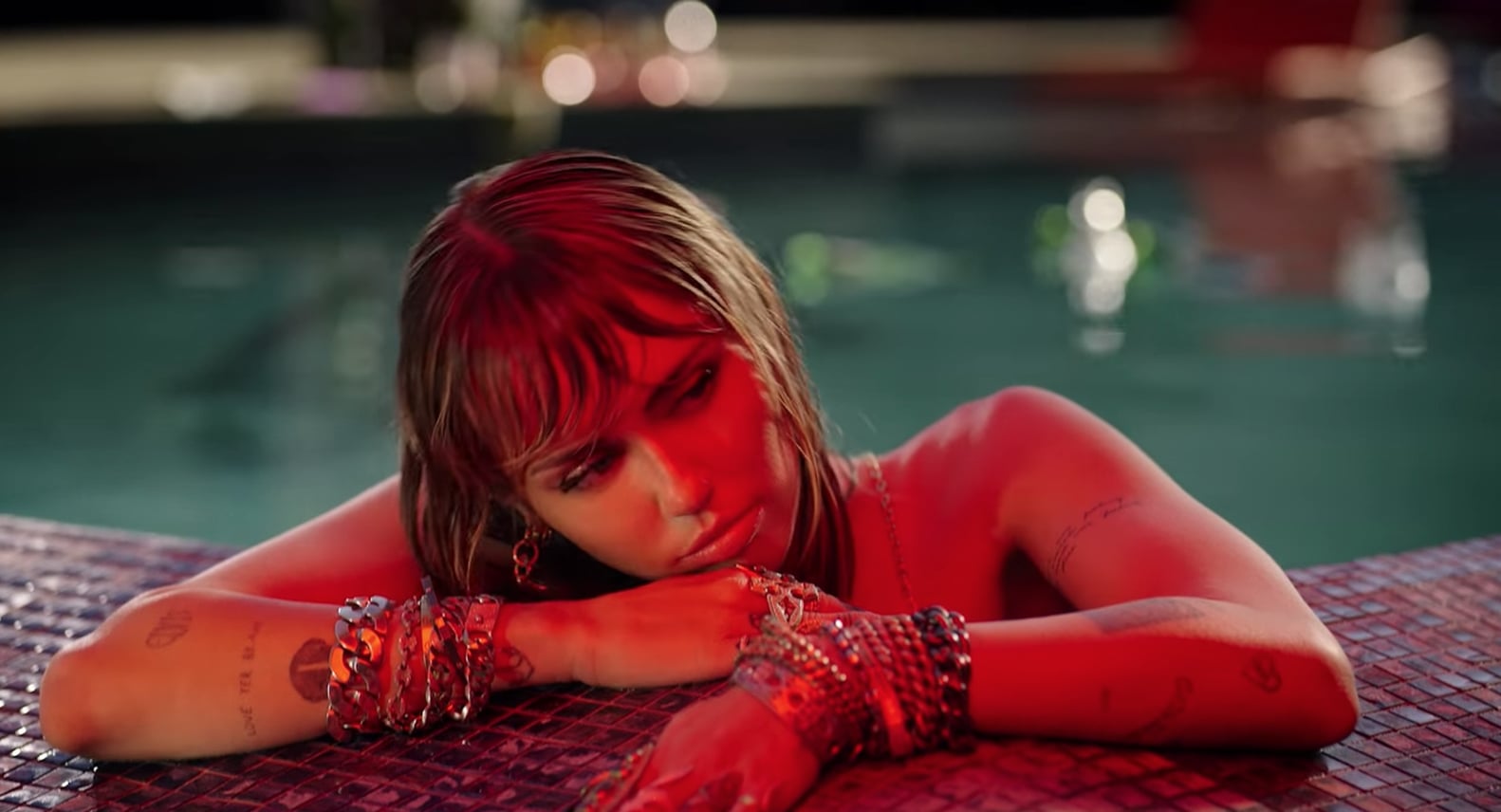 Miley Cyrus's Chain-Mail Dress in "Slide Away" Music Video | POPSUGAR ...