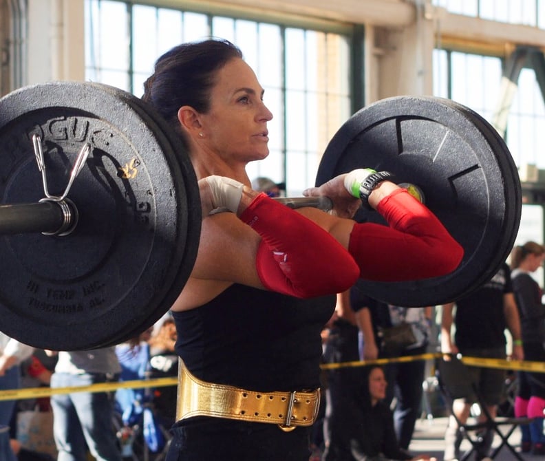 sandy lifting weights