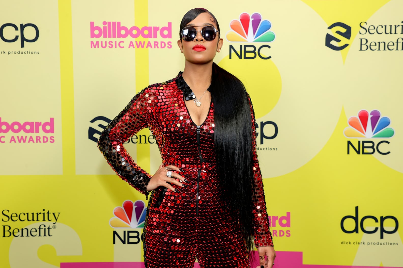 H.E.R.'s Red Sequin Dior Jumpsuit at Billboard Music Awards | PS Fashion