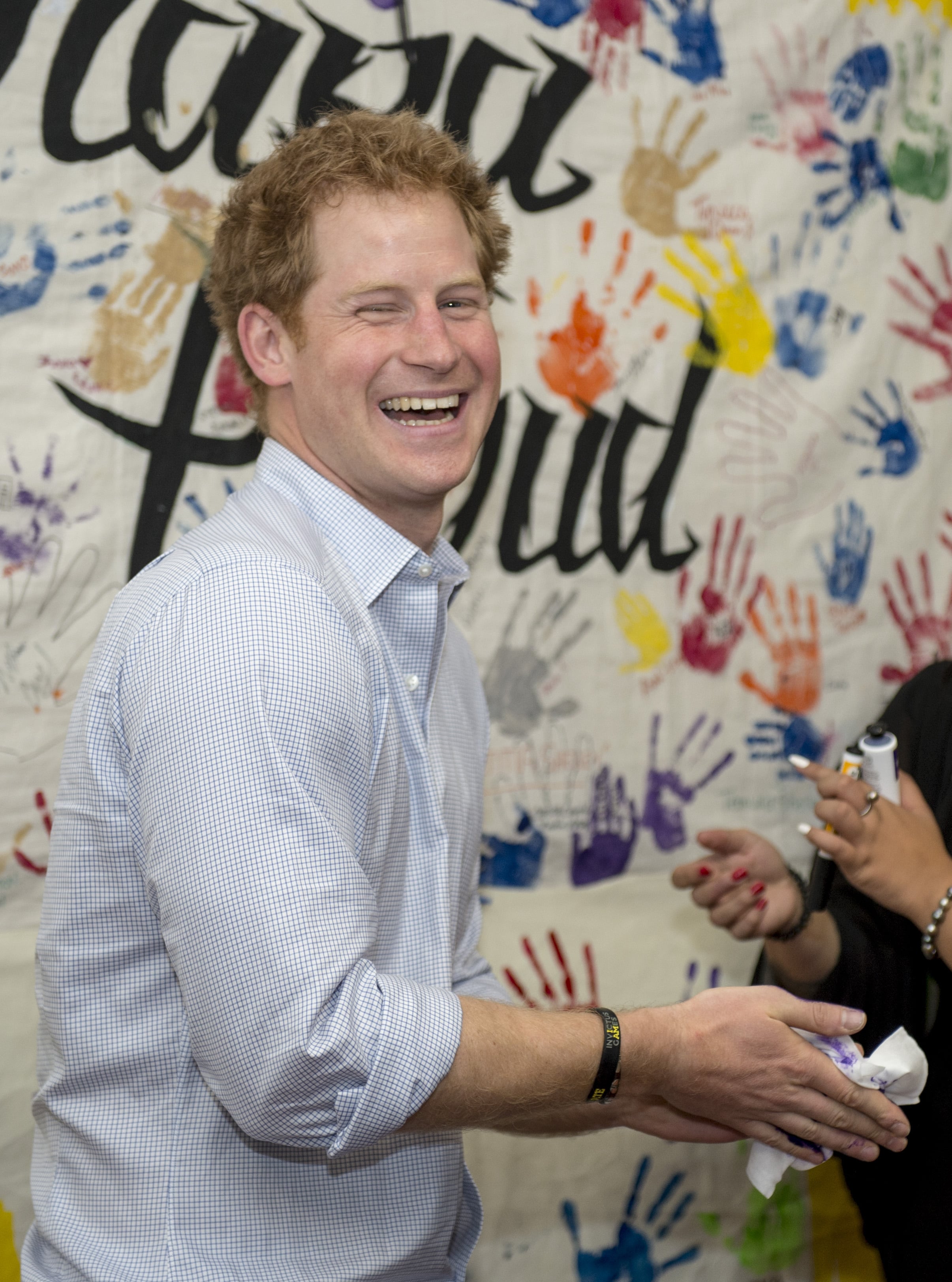 Prince Harry Puts Purple Handprint on Photographer's Head | POPSUGAR ...