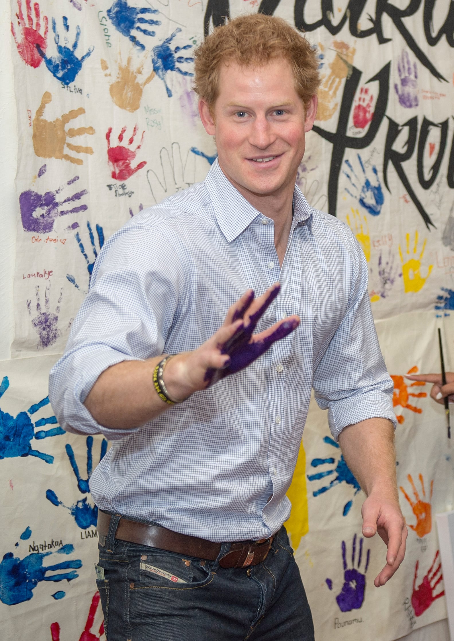 Prince Harry Puts Purple Handprint on Photographer's Head | POPSUGAR ...