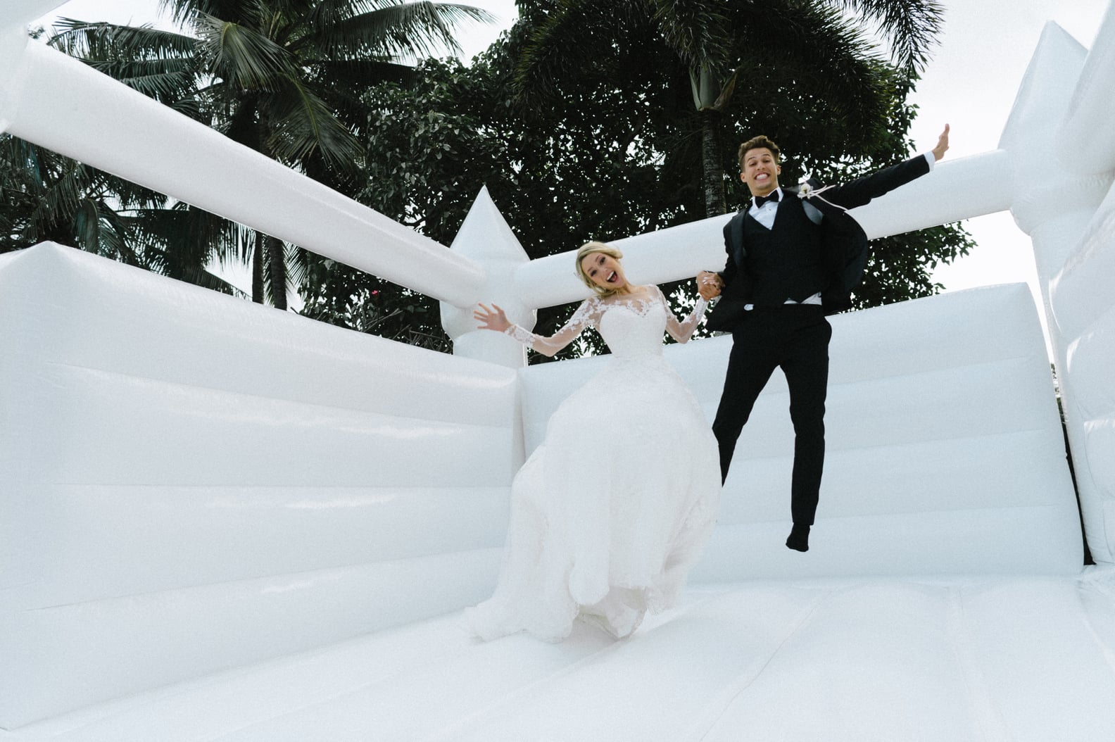 Couple Takes Wedding Photos in Bouncy Castle | PS Love