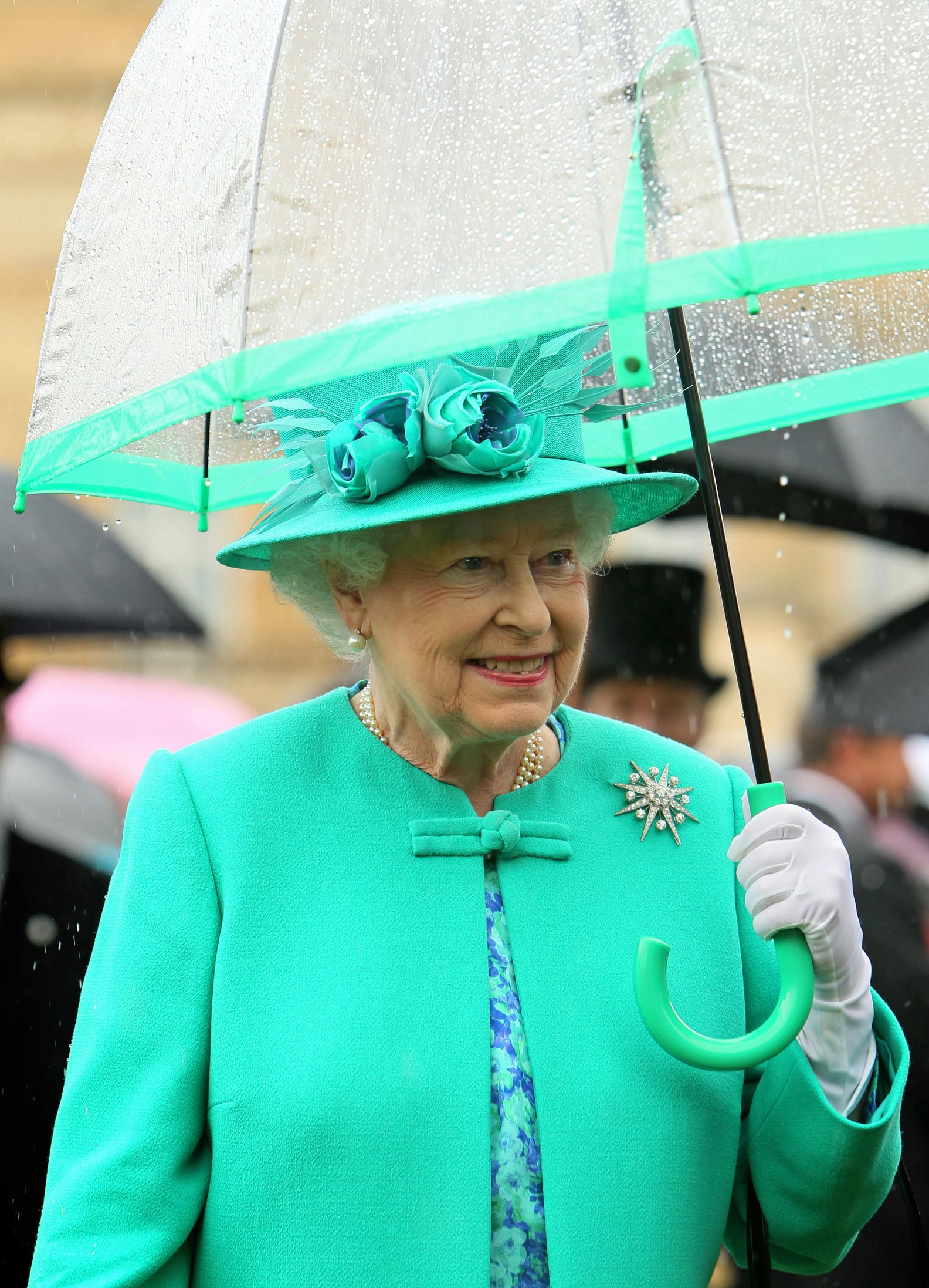 Why the Queen Wears So Many Bright Colors | PS Fashion