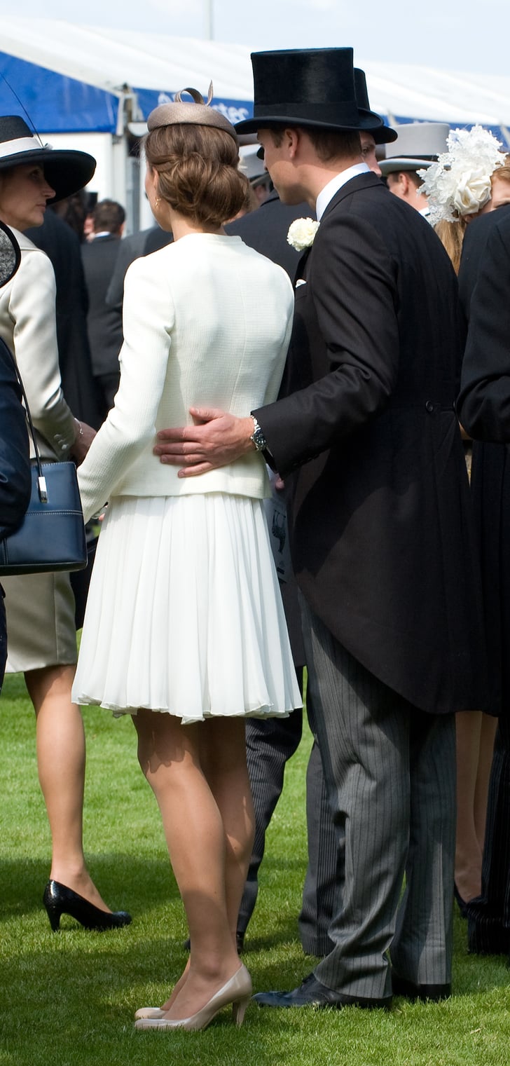 William put his arm around Kate during a day at the races in June ... William put his arm around Kate during a day at the races in June ...