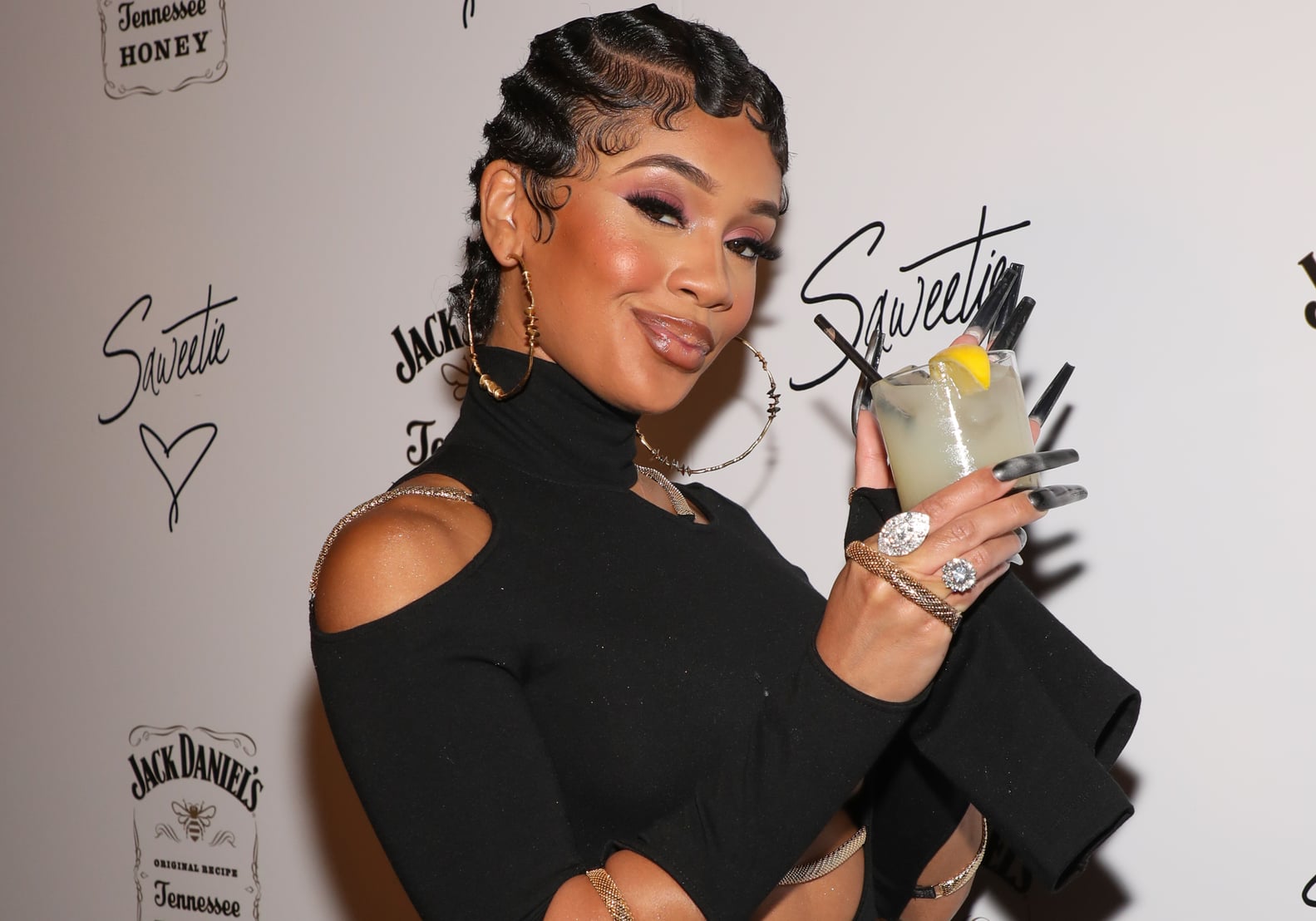 Saweetie Wears Black Cutout Christopher Kane Dress | POPSUGAR Fashion