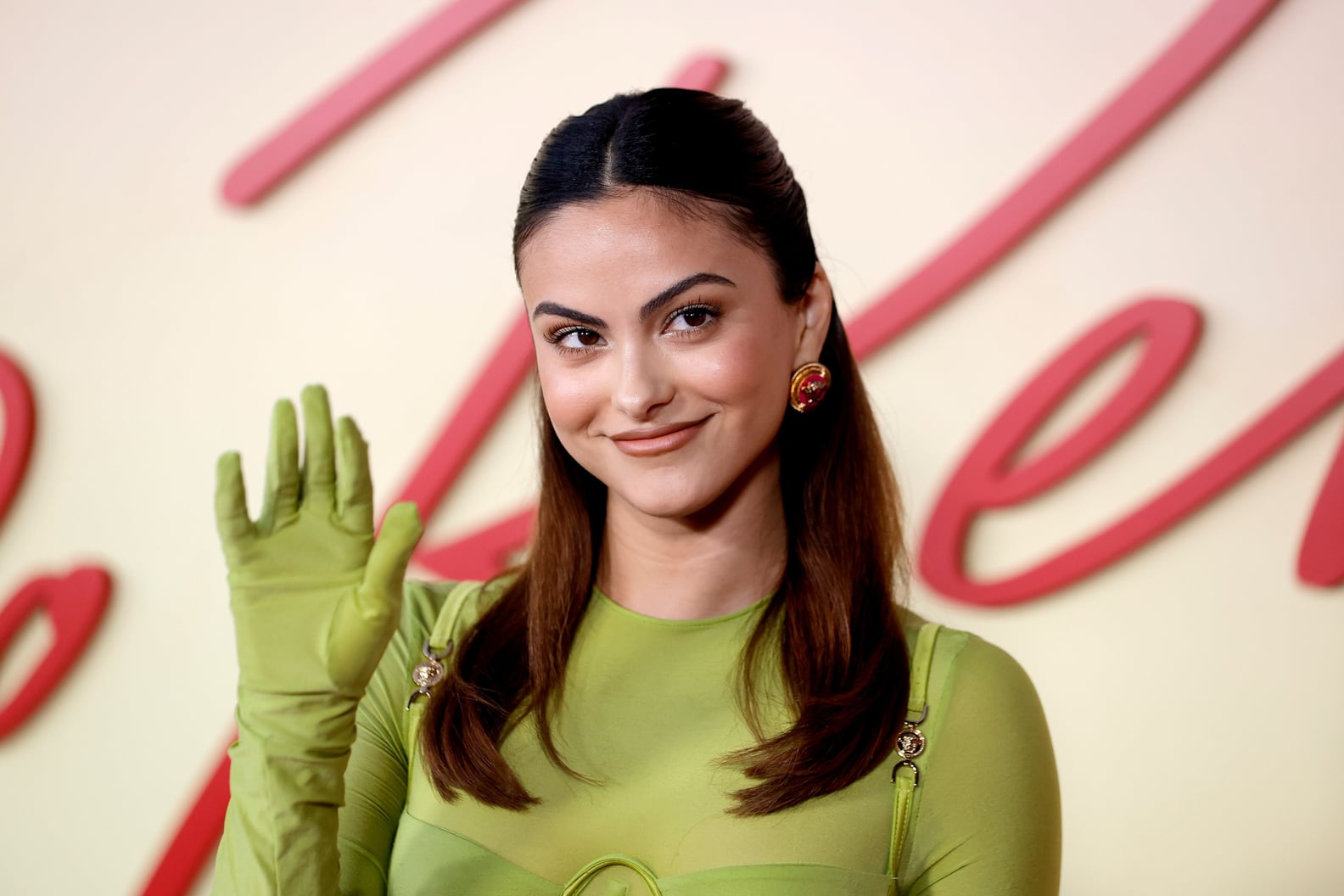 Camila Mendes Wears Green Versace Corset Top, Low-Rise Skirt | PS Fashion