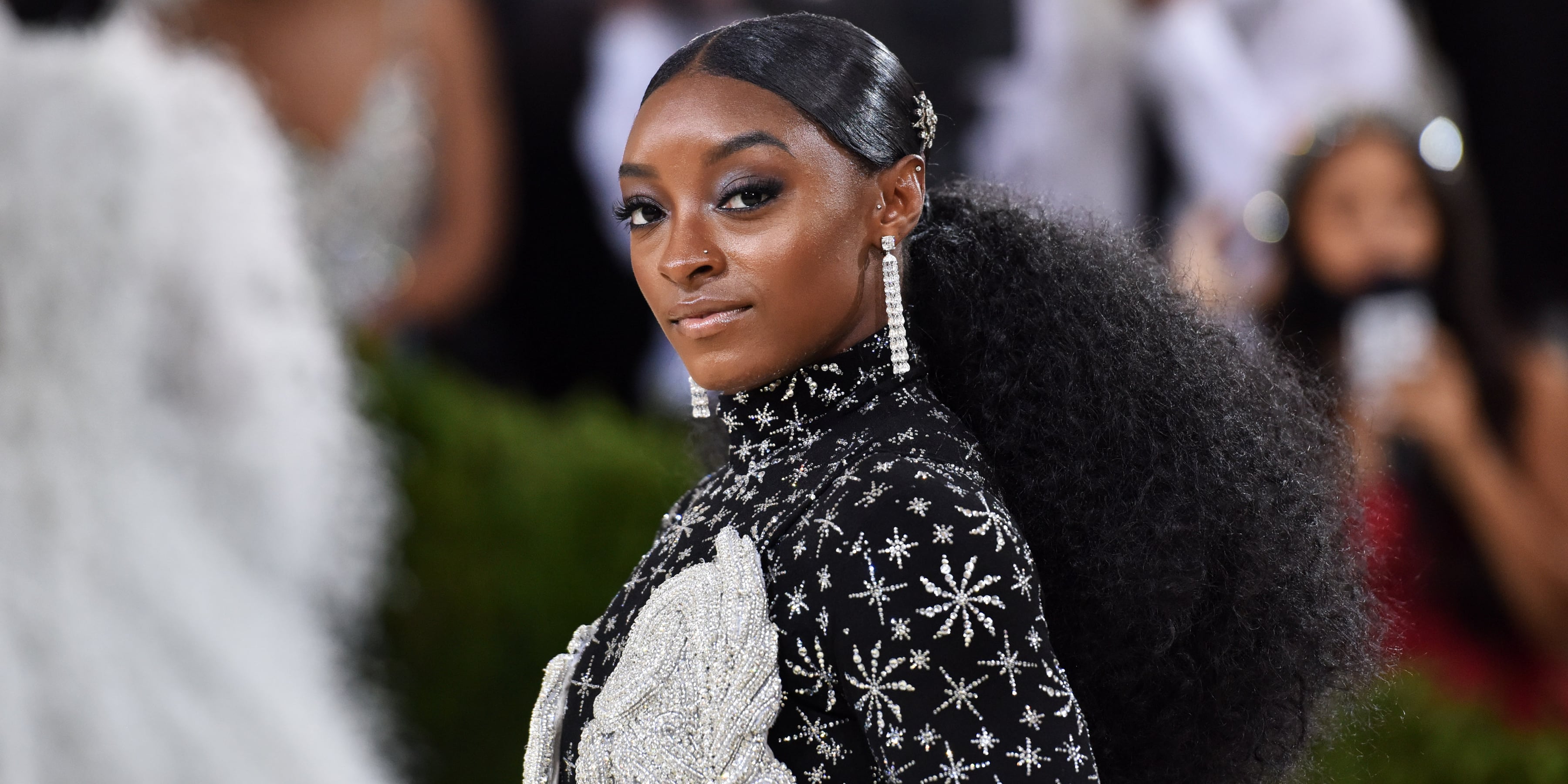 Simone Biles Beige Tube Top and Leather Pants on Instagram | PS Fashion