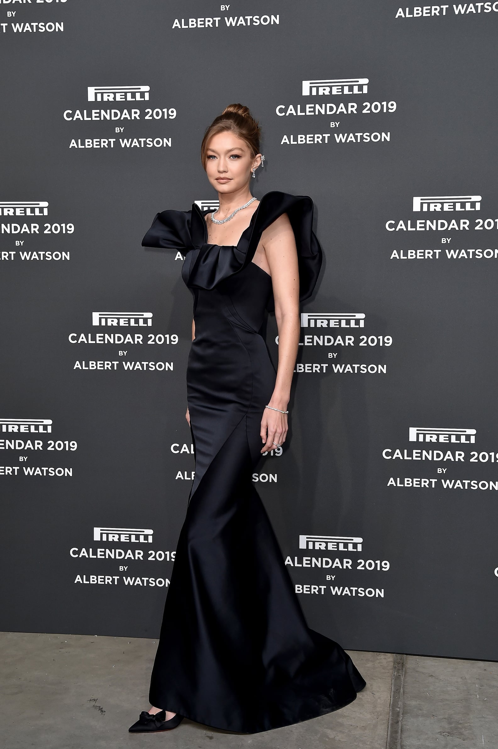 Gigi Hadid Black Zac Posen Dress at Pirelli Calendar Event | PS Fashion