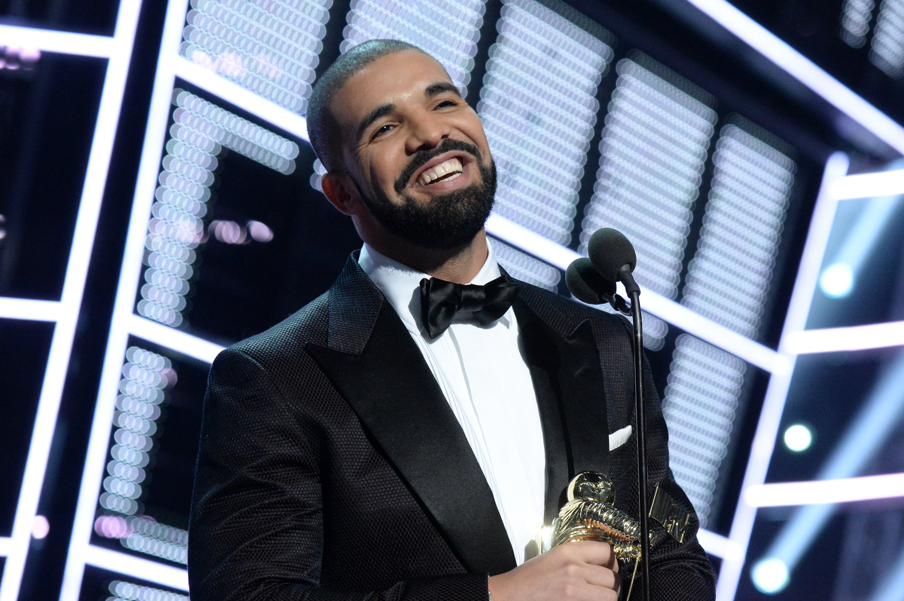 Drake Smiling With No Teeth