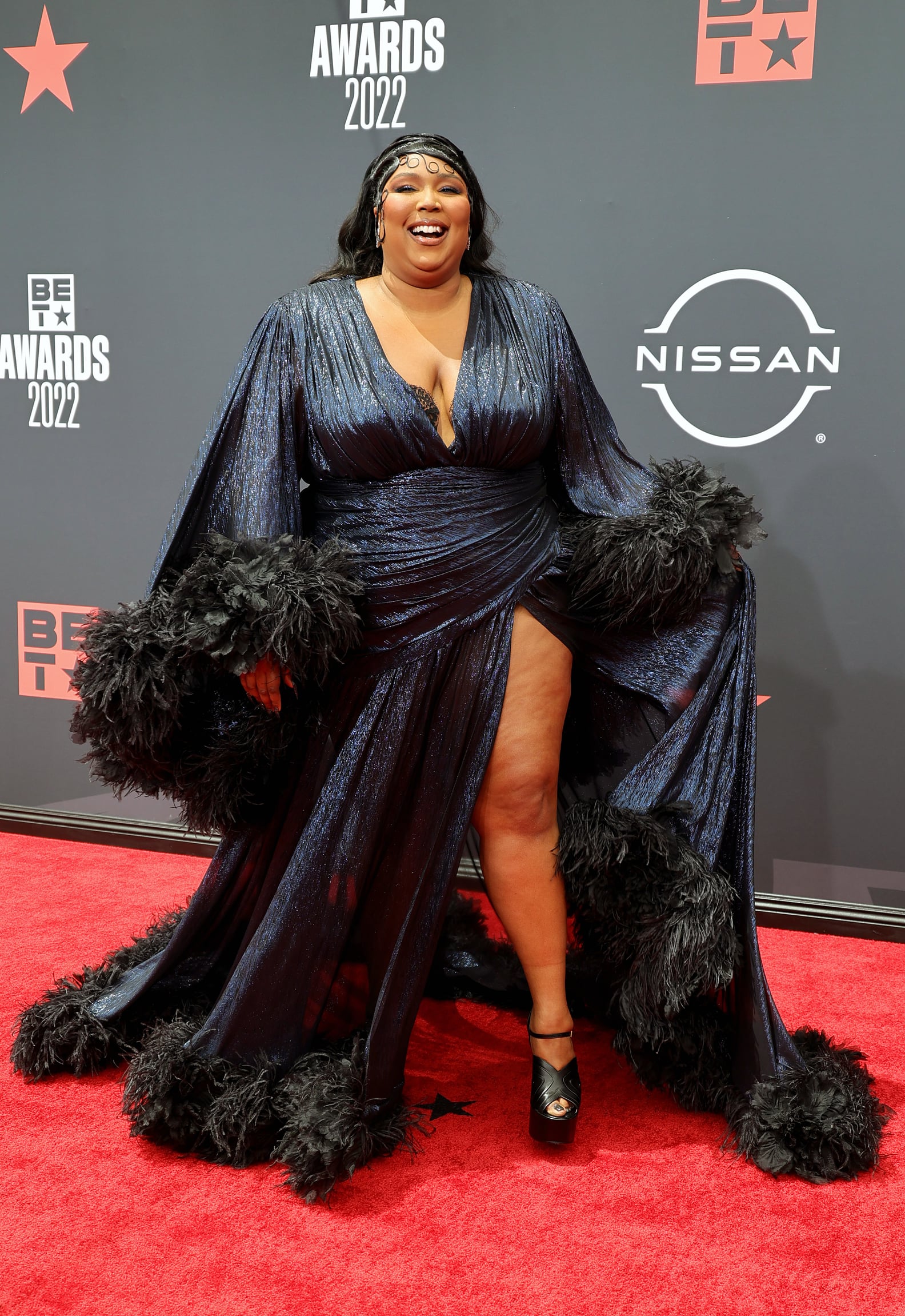 Lizzo Wears Gucci Dress With Leg Slit at 2022 BET Awards | PS Fashion