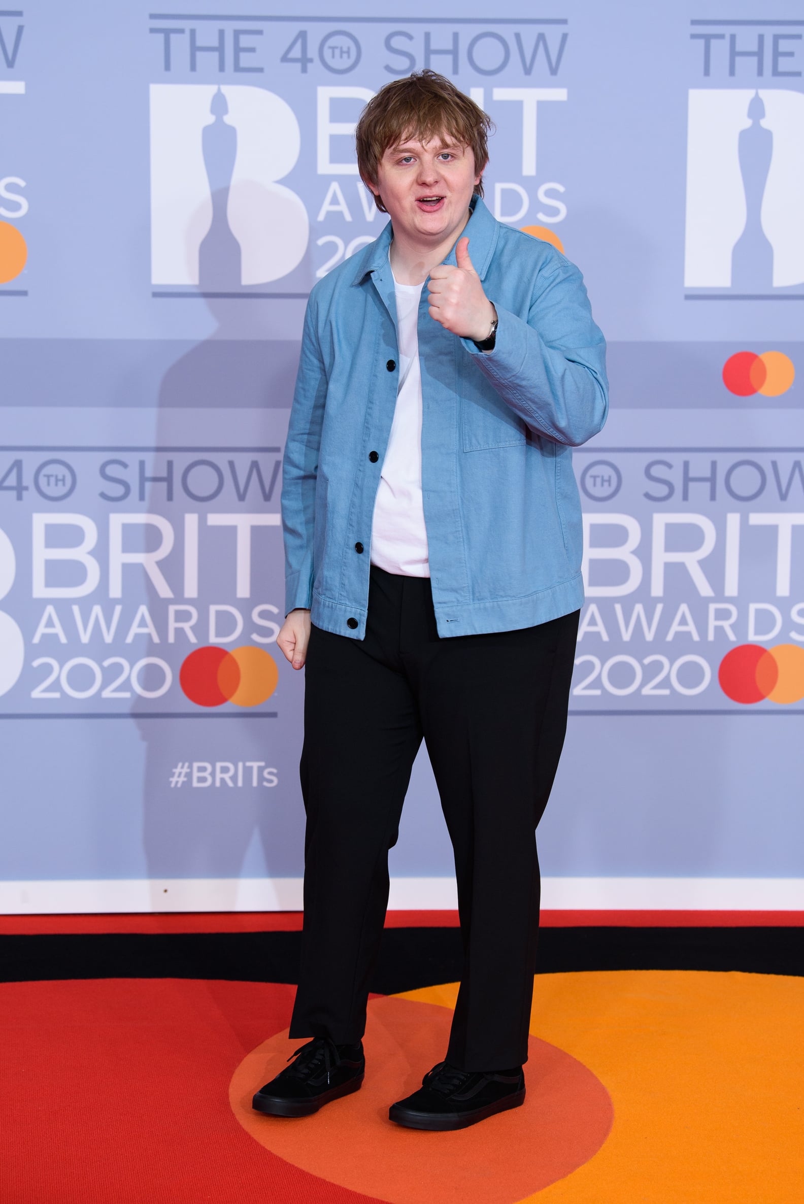Lewis Capaldi Posing on the 2020 BRIT Awards Red Carpet | PS Celebrity