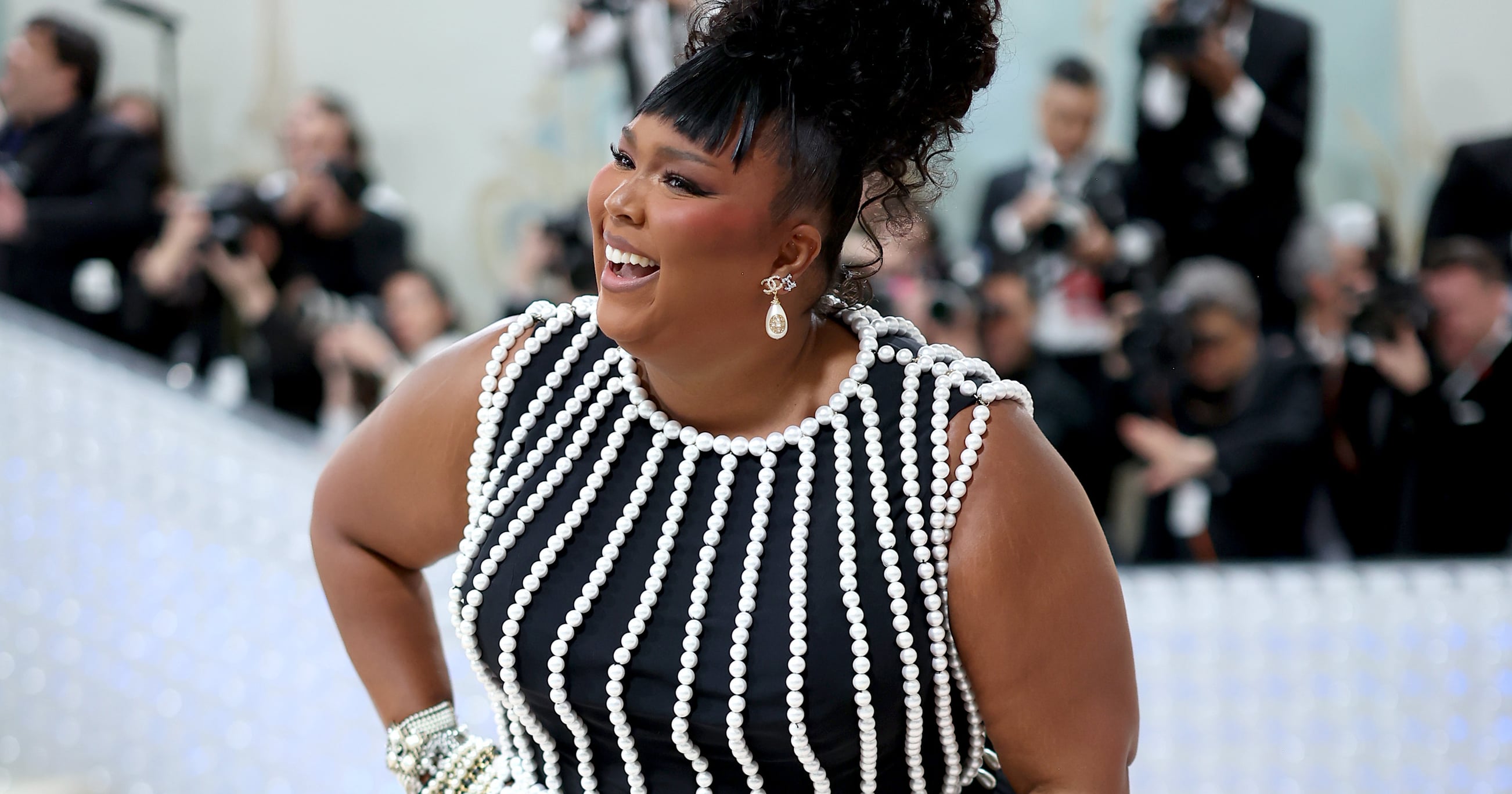 Lizzo's Micro Bangs Updo at the Met Gala 2023 | PS Beauty