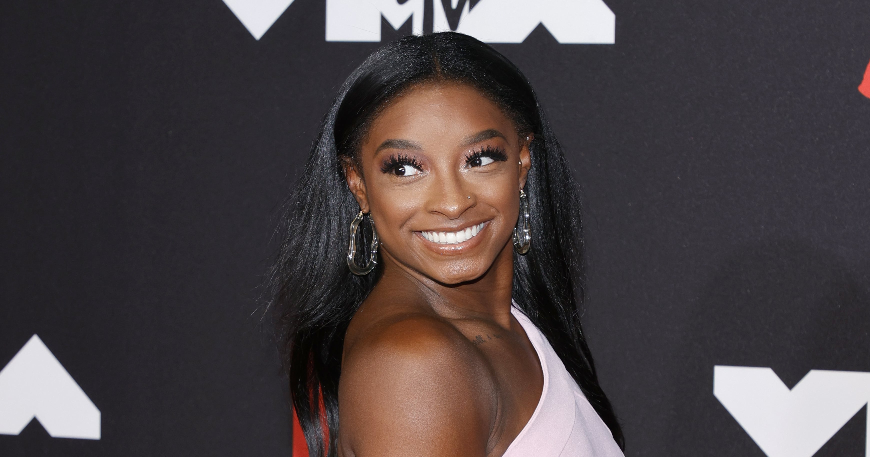 Simone Biles Styled a Corset With Ruched Leather Pants | PS Fashion