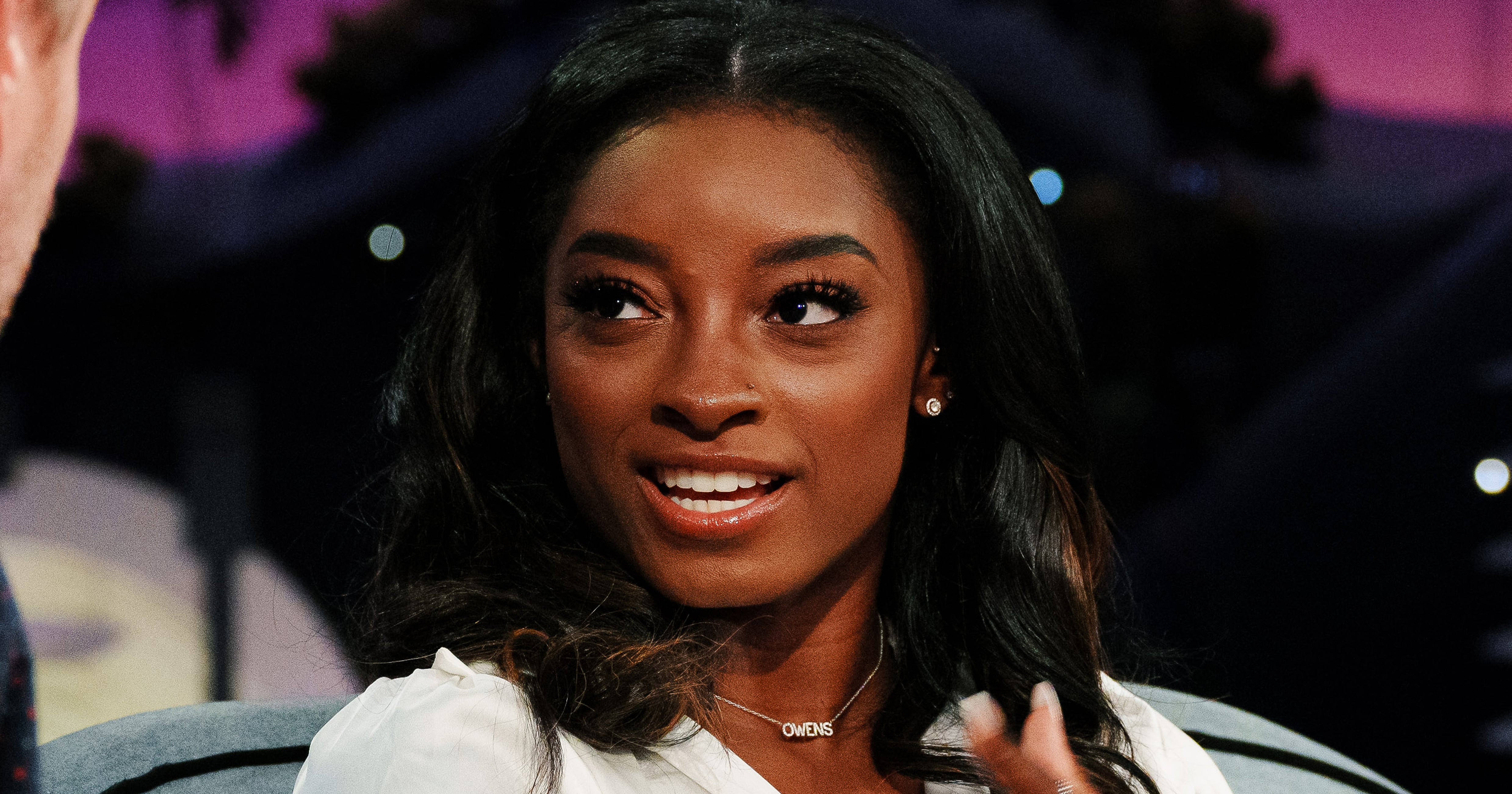 Simone Biles Wears a White Halter Crisscross Corset Top | PS Fashion