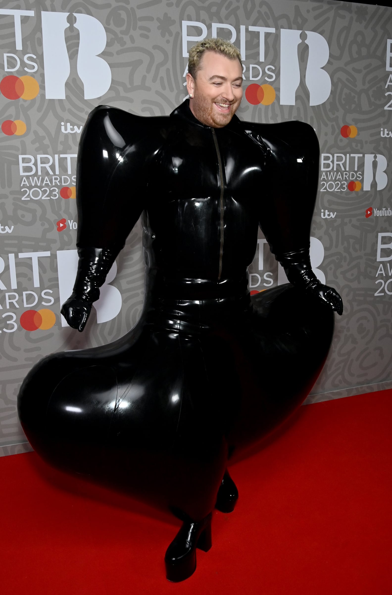 Sam Smith Wears Inflatable Jumpsuit to the Brits 2023 | PS Fashion