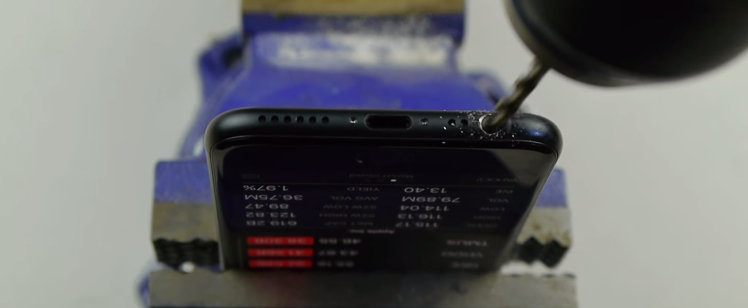 Video Tricks People Into Drilling Holes in the iPhone 7 | PS Tech