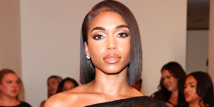 Lori Harvey Black Dress With Thigh-High Slit | Revolve Party | POPSUGAR ...