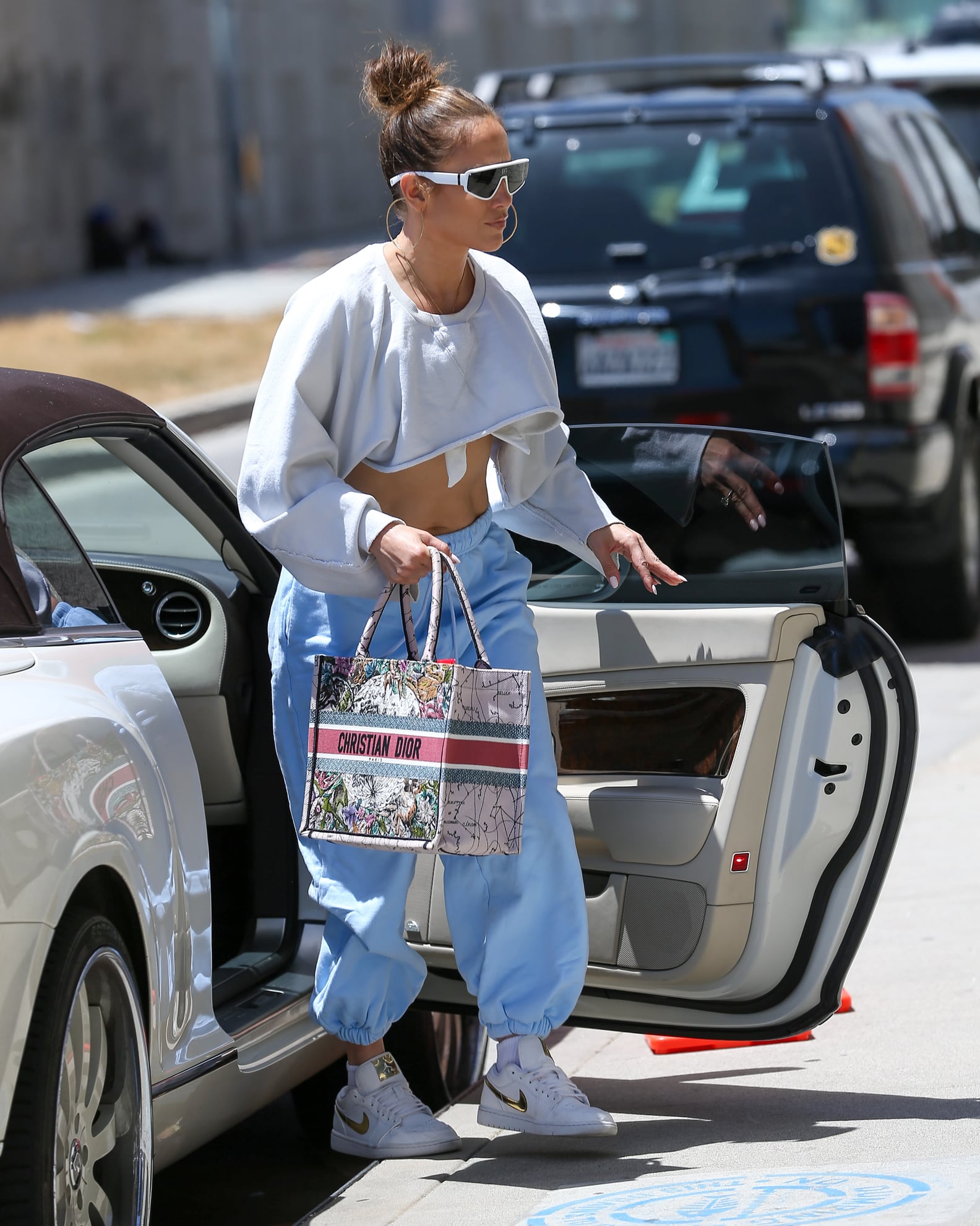 J Lo Carries Her Monogrammed Dior Book Tote to the Gym | PS Fashion
