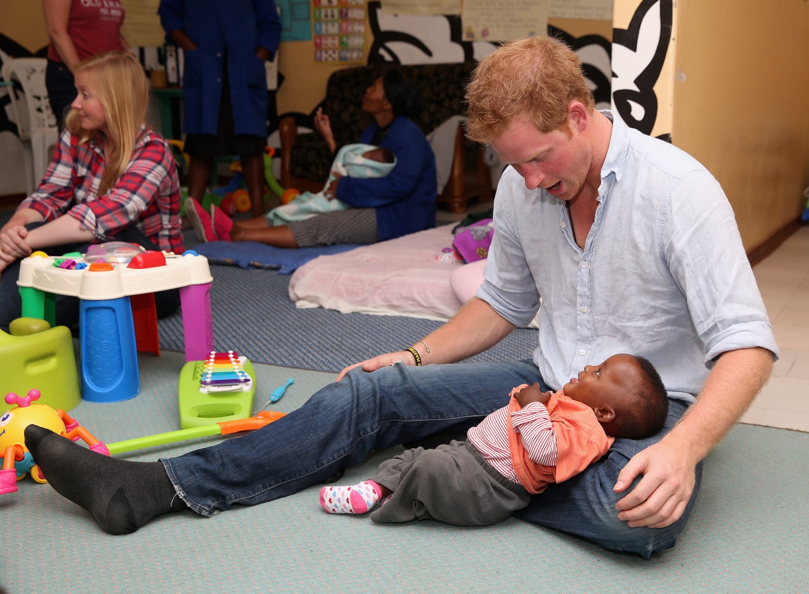 The Cutest Pictures of Prince Harry With Kids | PS Celebrity