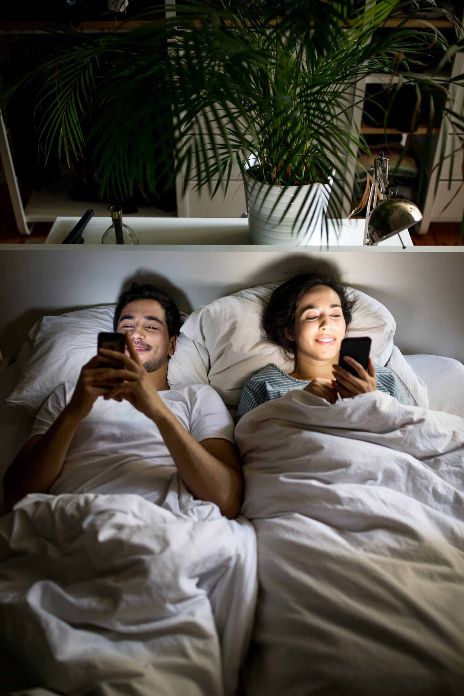 Why Using Technology Before Bed Isn't Bad For Couples | PS Love