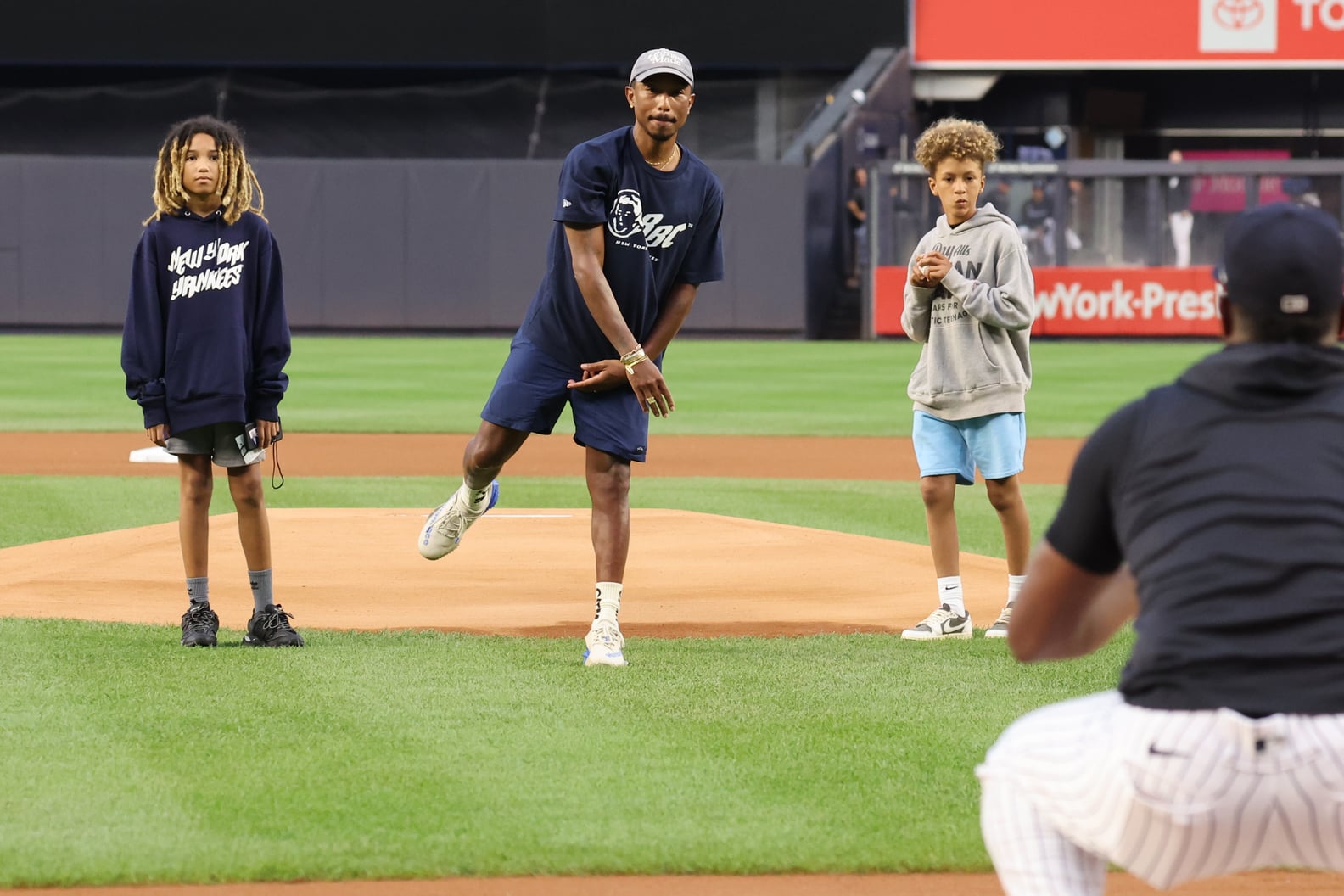 Pharrell and Son Throw First Pitch at New York Yankees Game | PS Celebrity