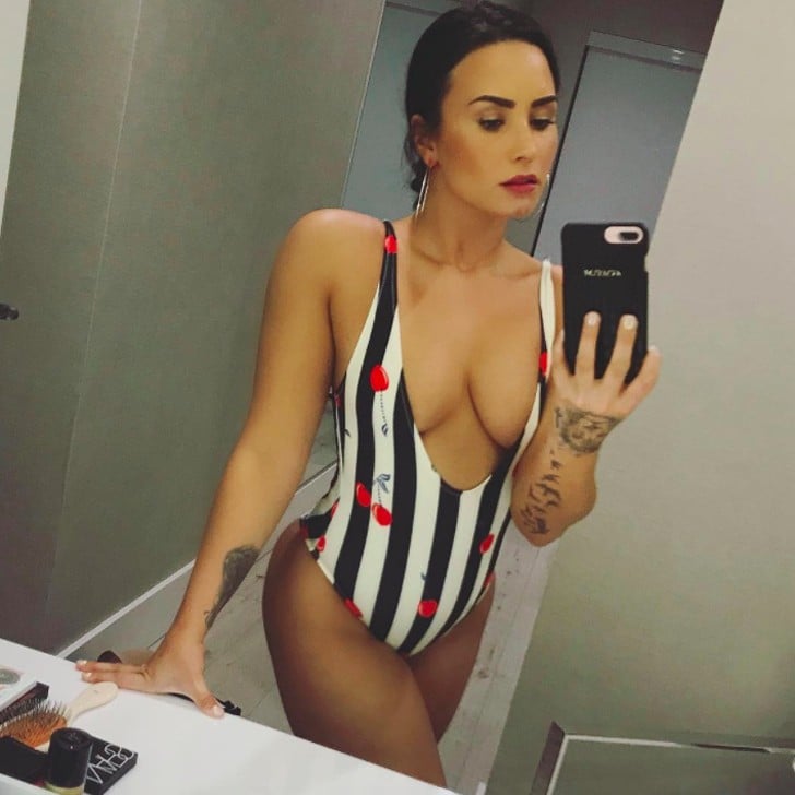 Demi Lovatos Cherry Print Solid And Striped Swimsuit Popsugar Fashion