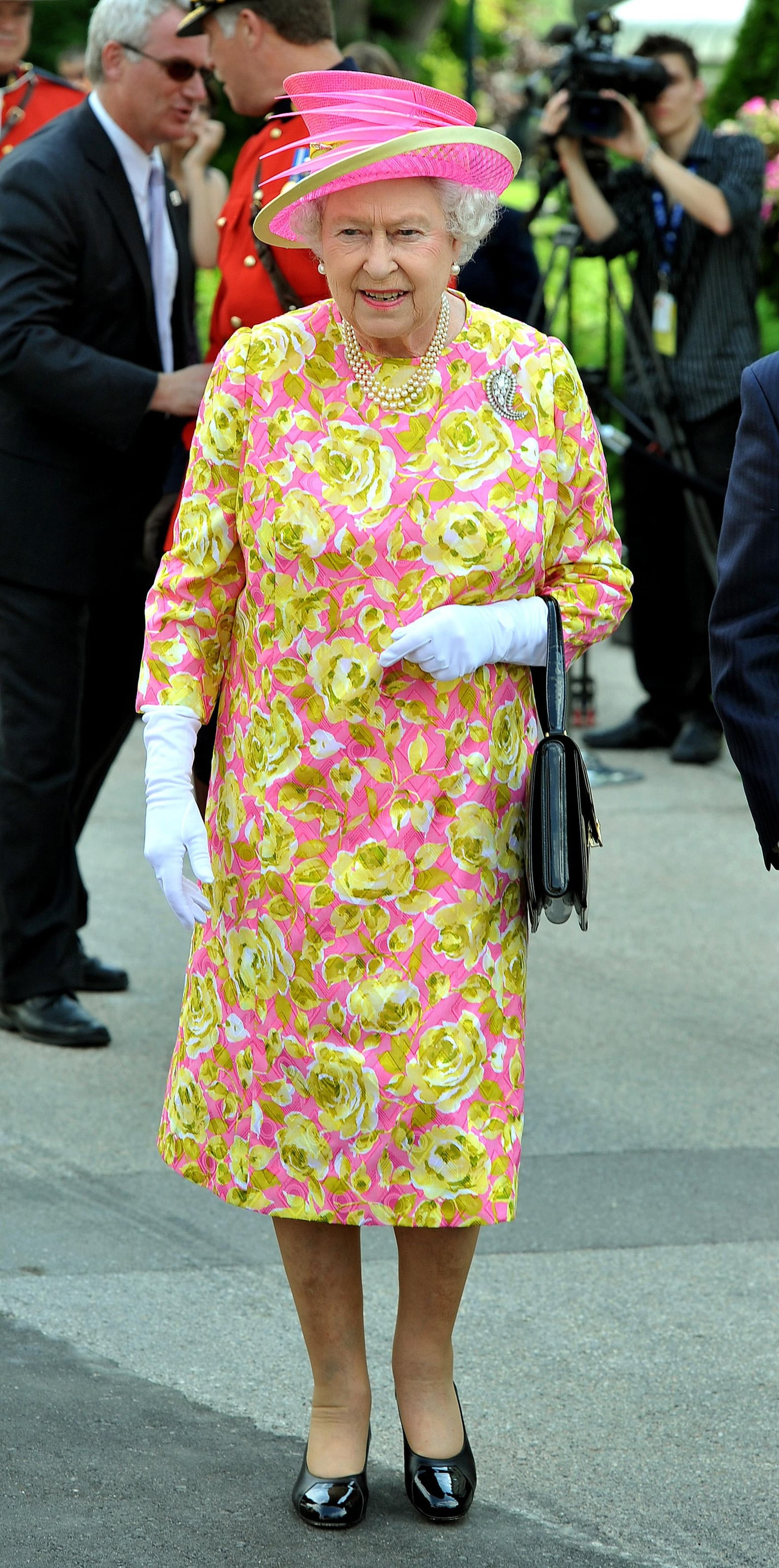 Why the Queen Wears So Many Bright Colors | PS Fashion