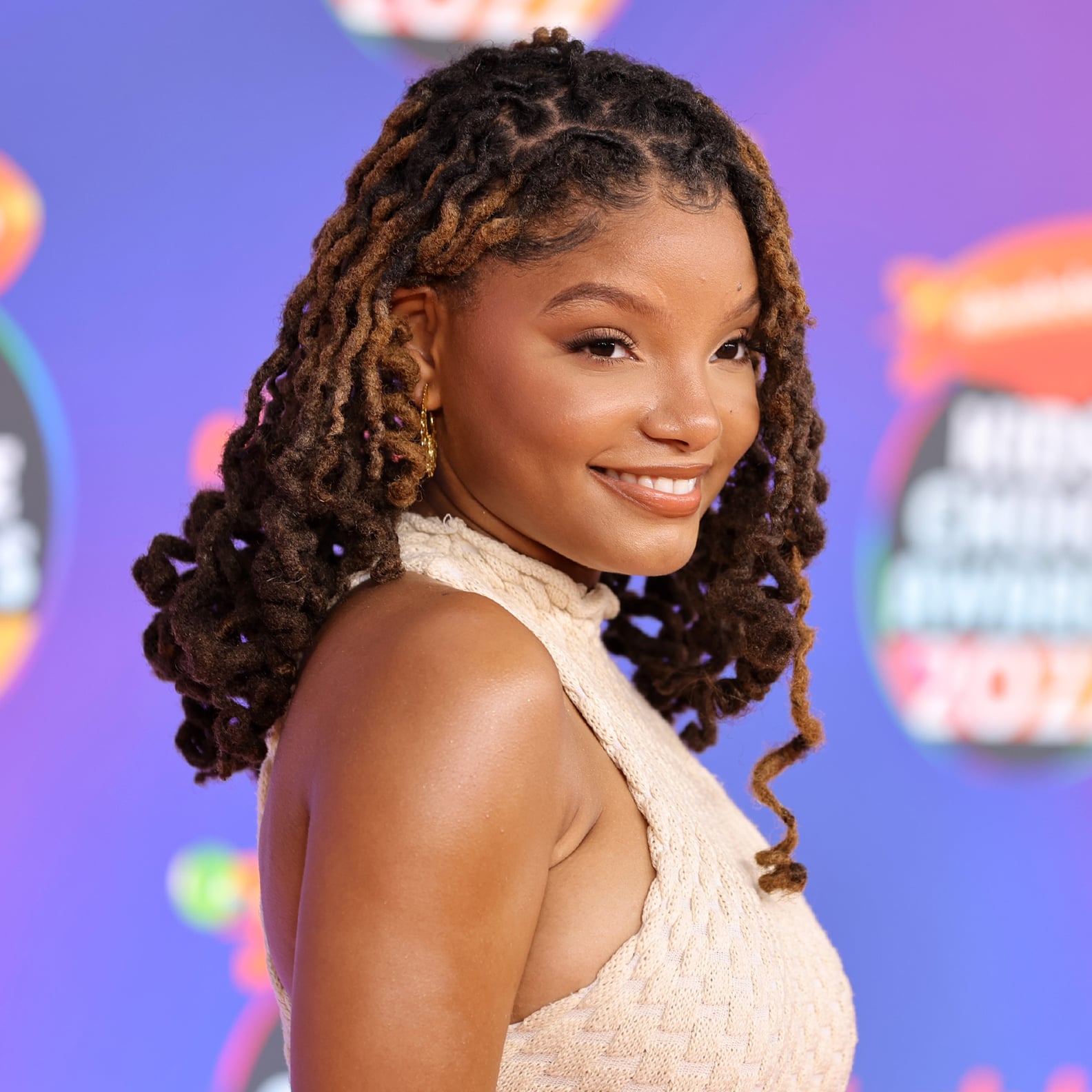 Halle Bailey Wears Cutout Crop Knit Sweater For Date Night | PS Fashion