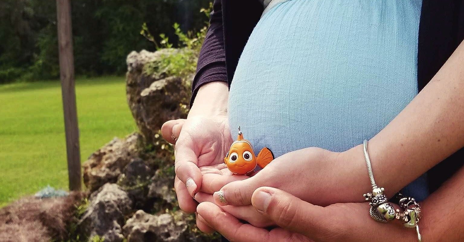 Pregnant Woman Posing With Finding Nemo Figurine | POPSUGAR Family